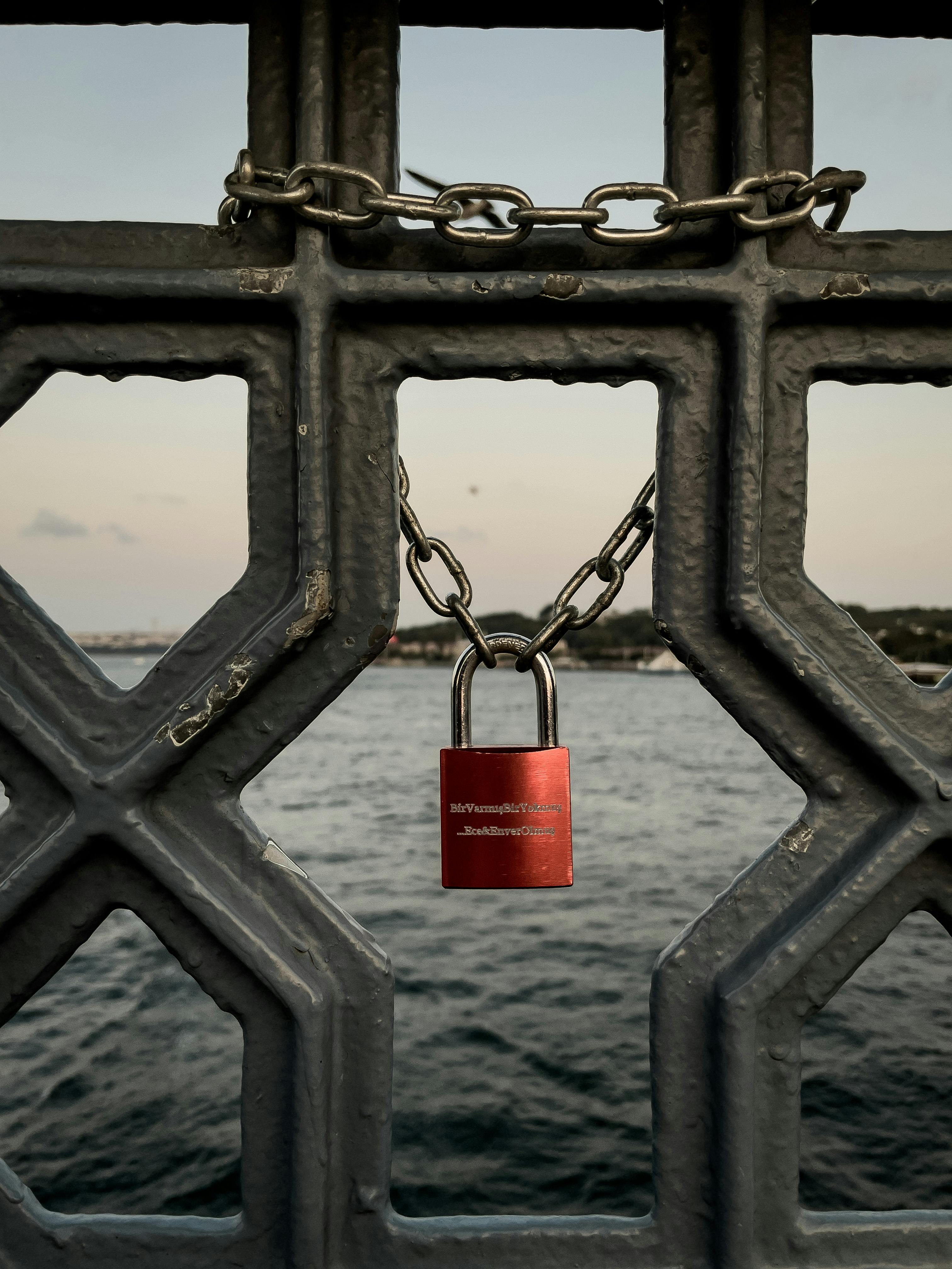 Selective Focus Photo of Red Padlock with Chains on a Fence · Free ...