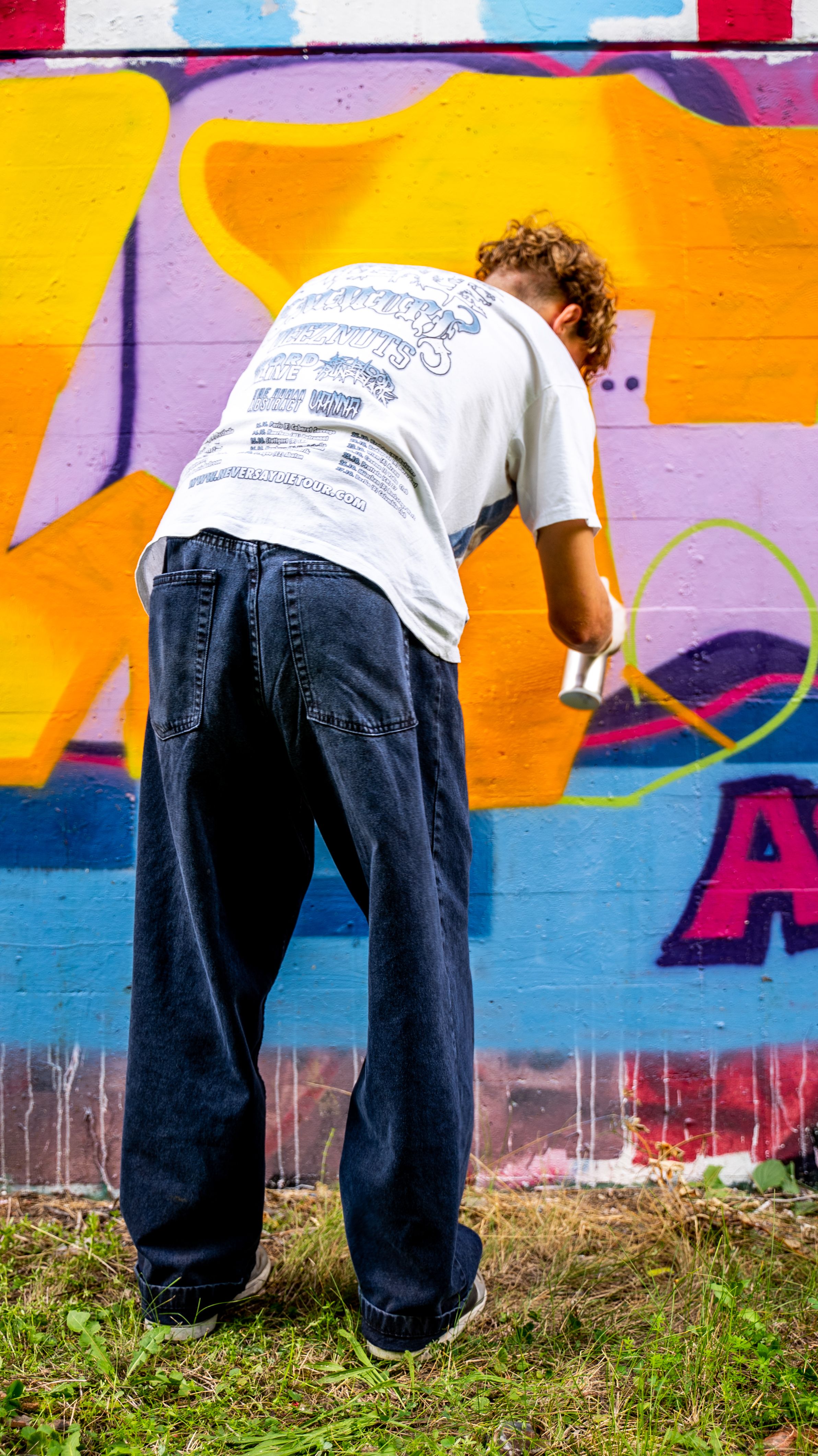 A Person Painting a Wall with Spray Paint · Free Stock Photo