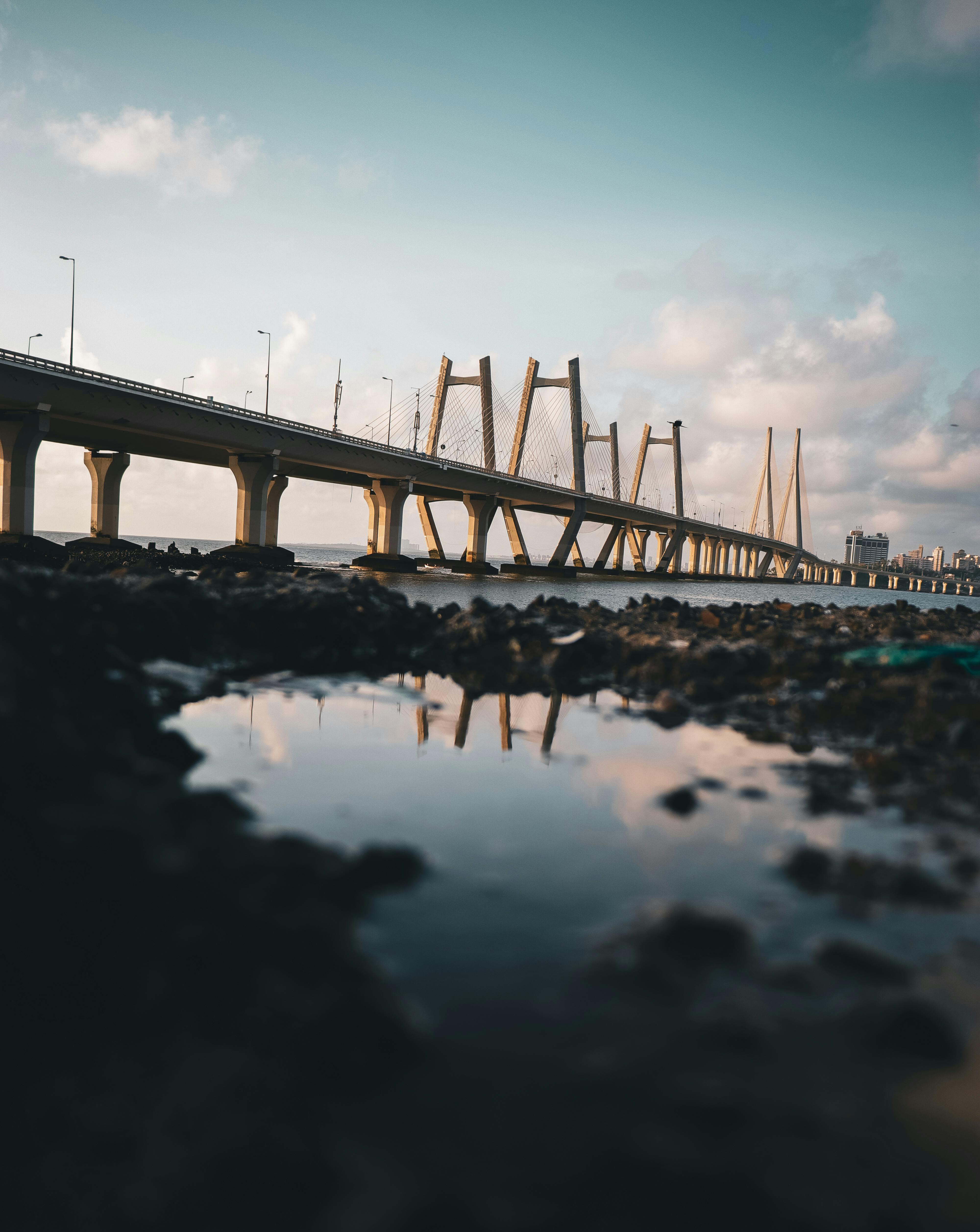 Concrete Bridges Reflecting on Calm Waters · Free Stock Photo