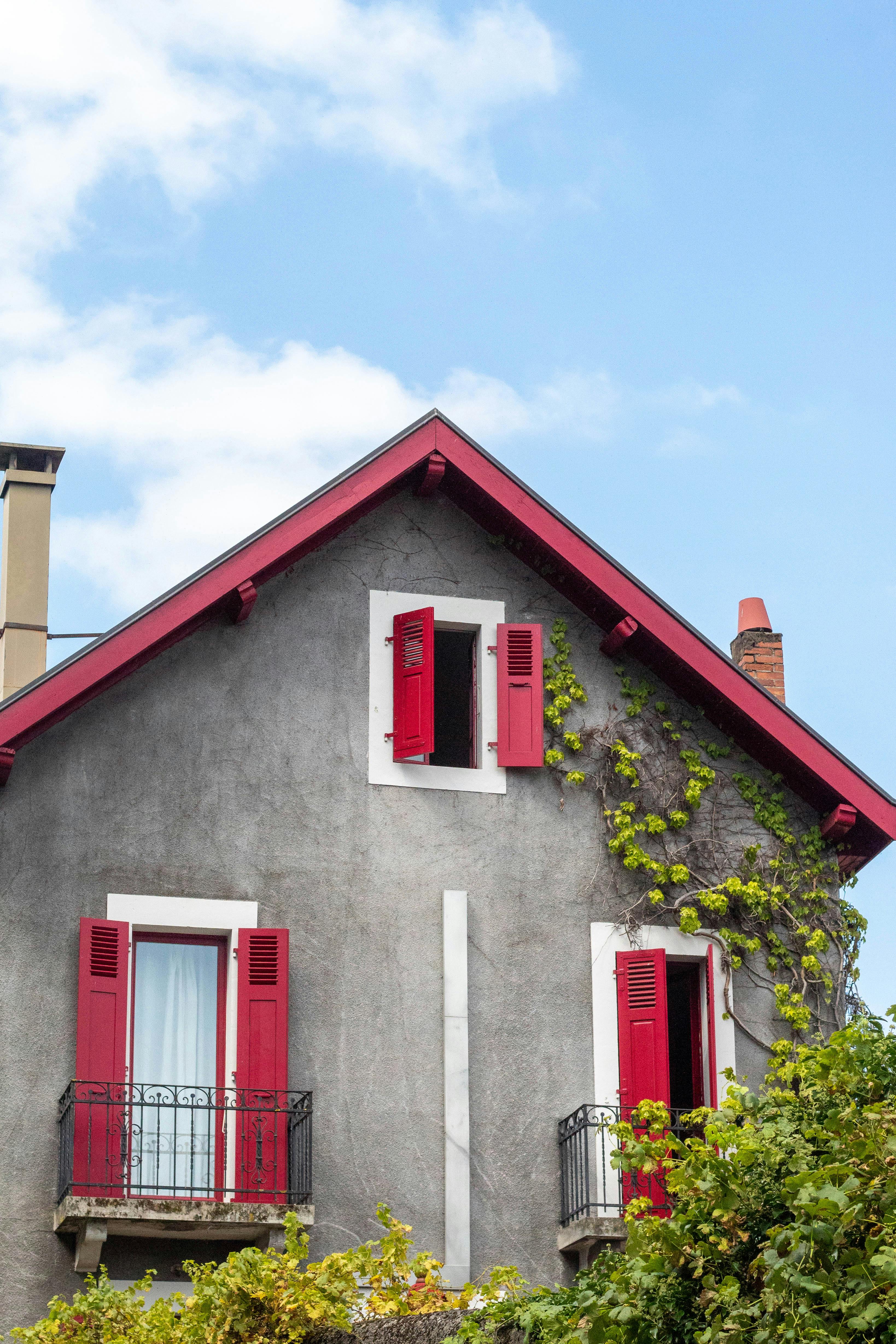 Red and White Concrete House · Free Stock Photo