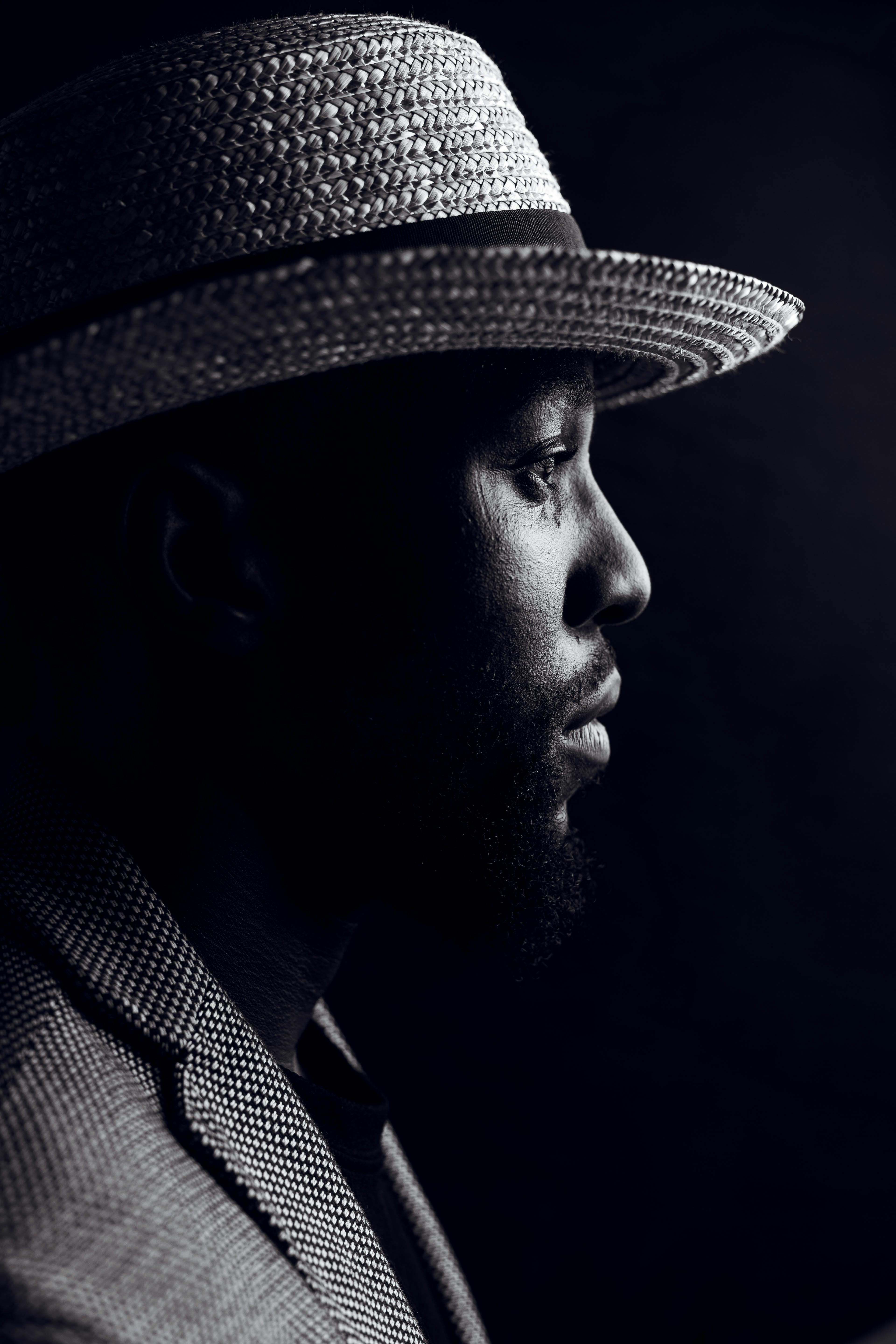 Side View Photo Of A Man Wearing Hat · Free Stock Photo