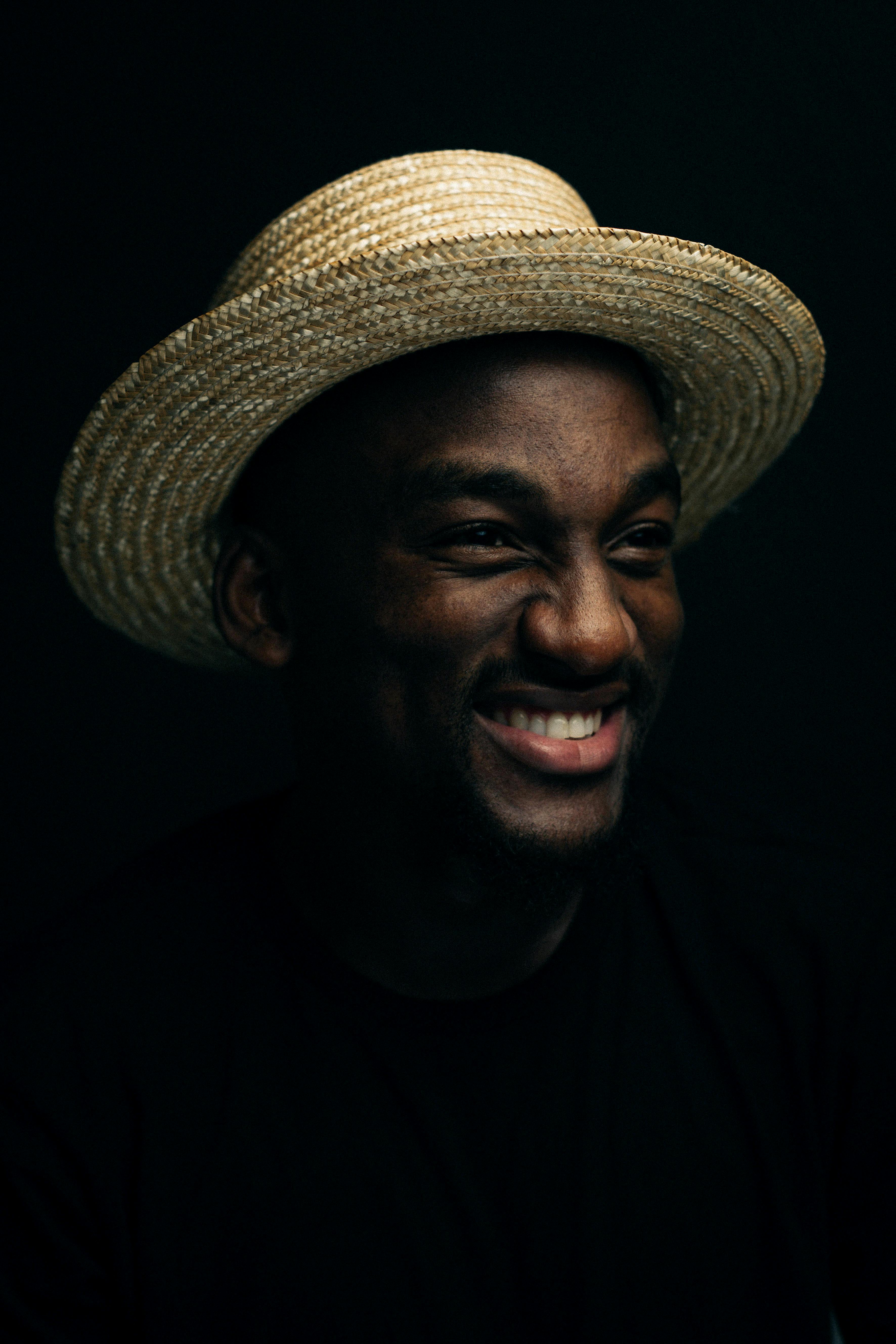 Man in Brown Hat Smiling · Free Stock Photo