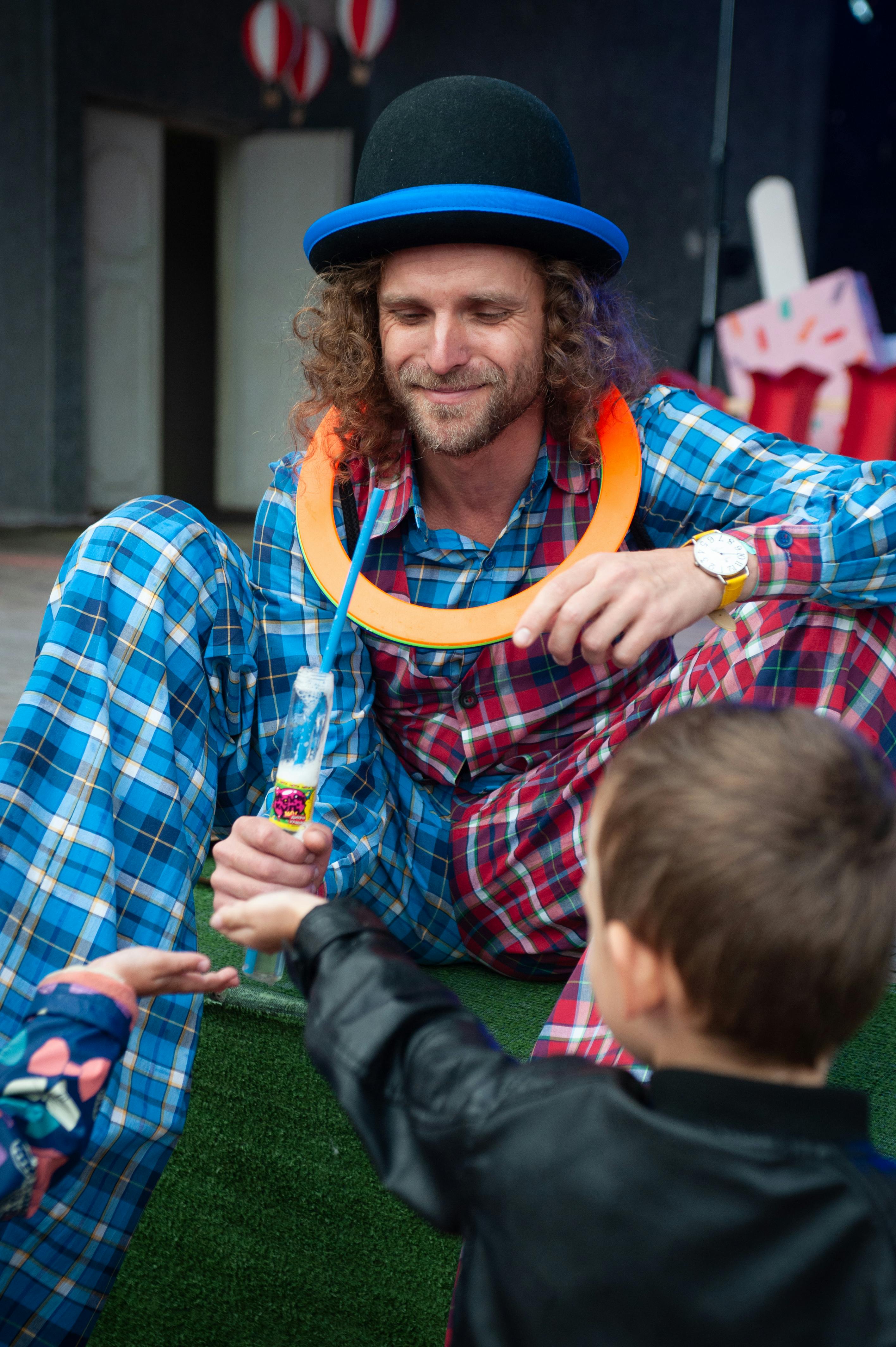 A Magician Performing in Front of the Kids · Free Stock Photo