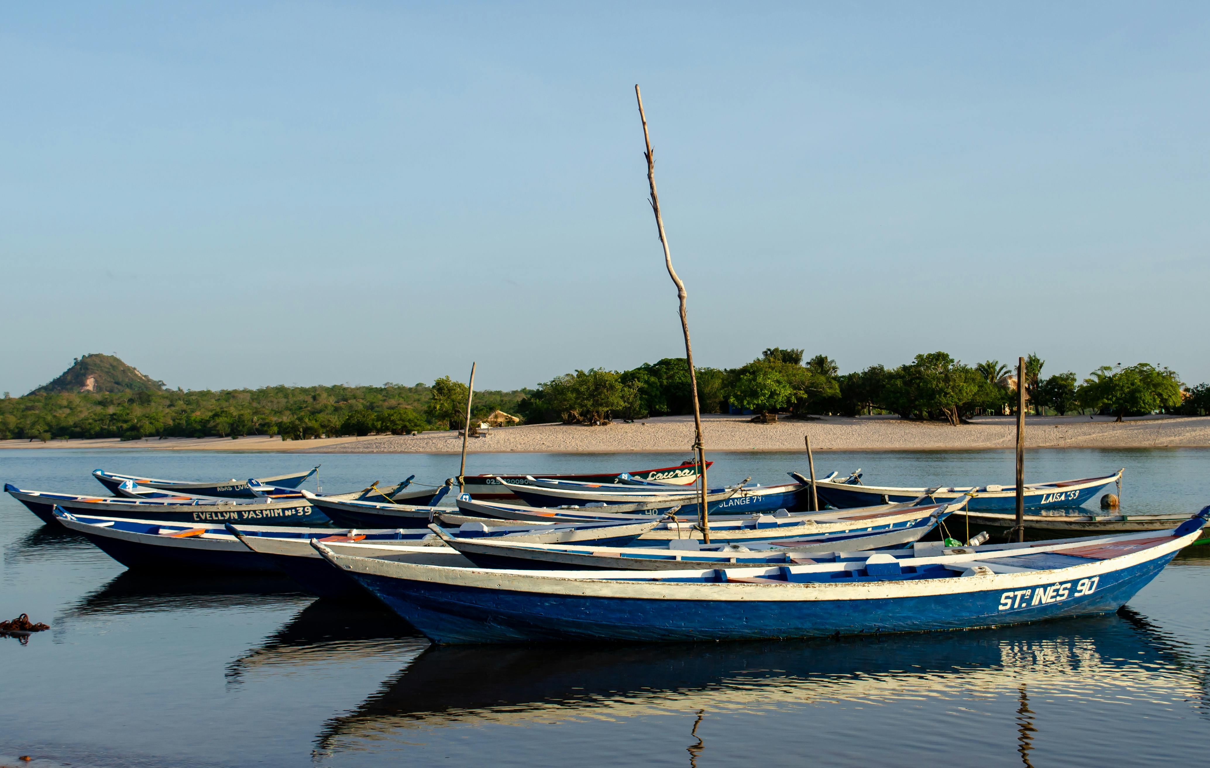 Clear Sky over Small Empty Boat on Lake · Free Stock Photo