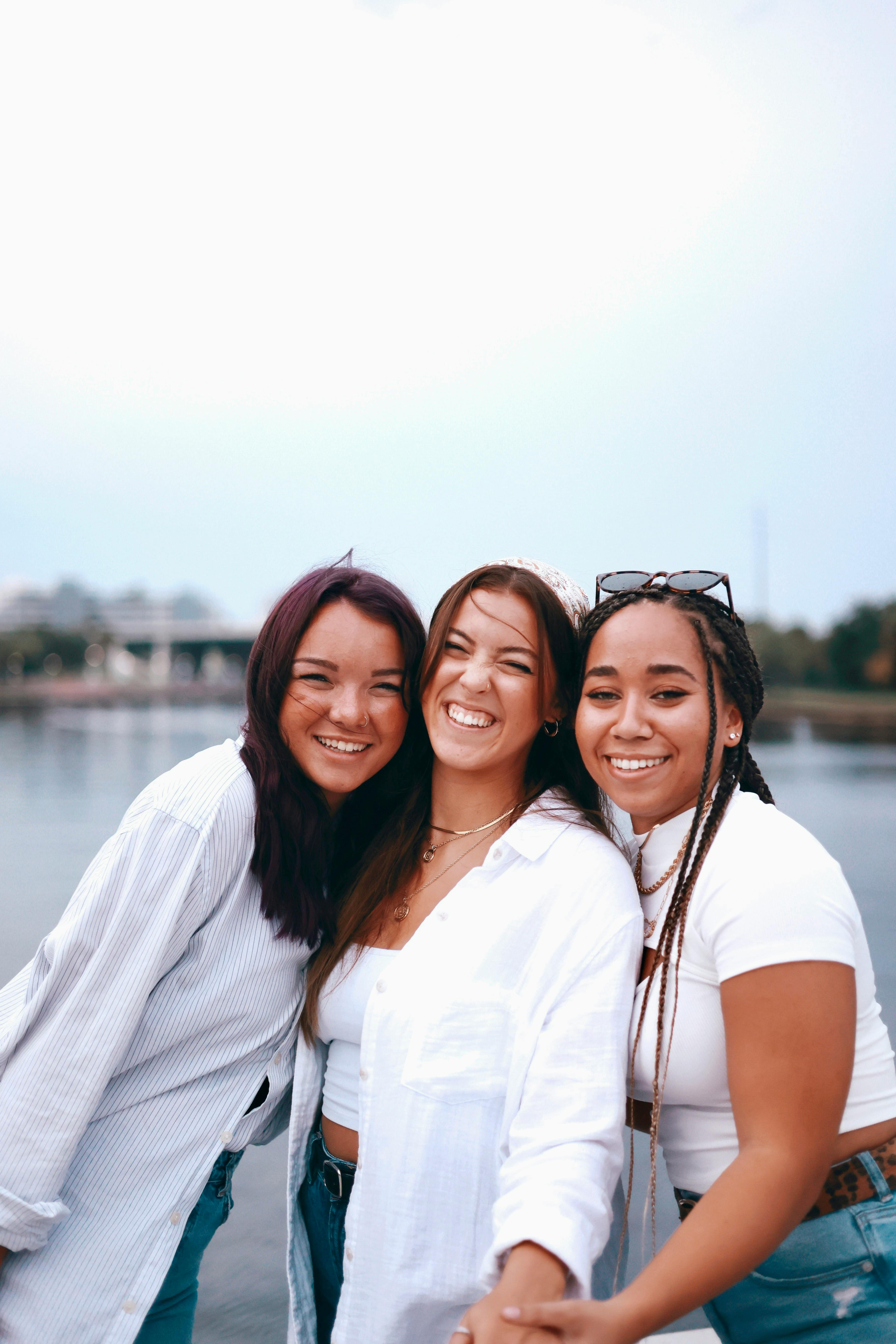 A Group of Women Posing Together · Free Stock Photo