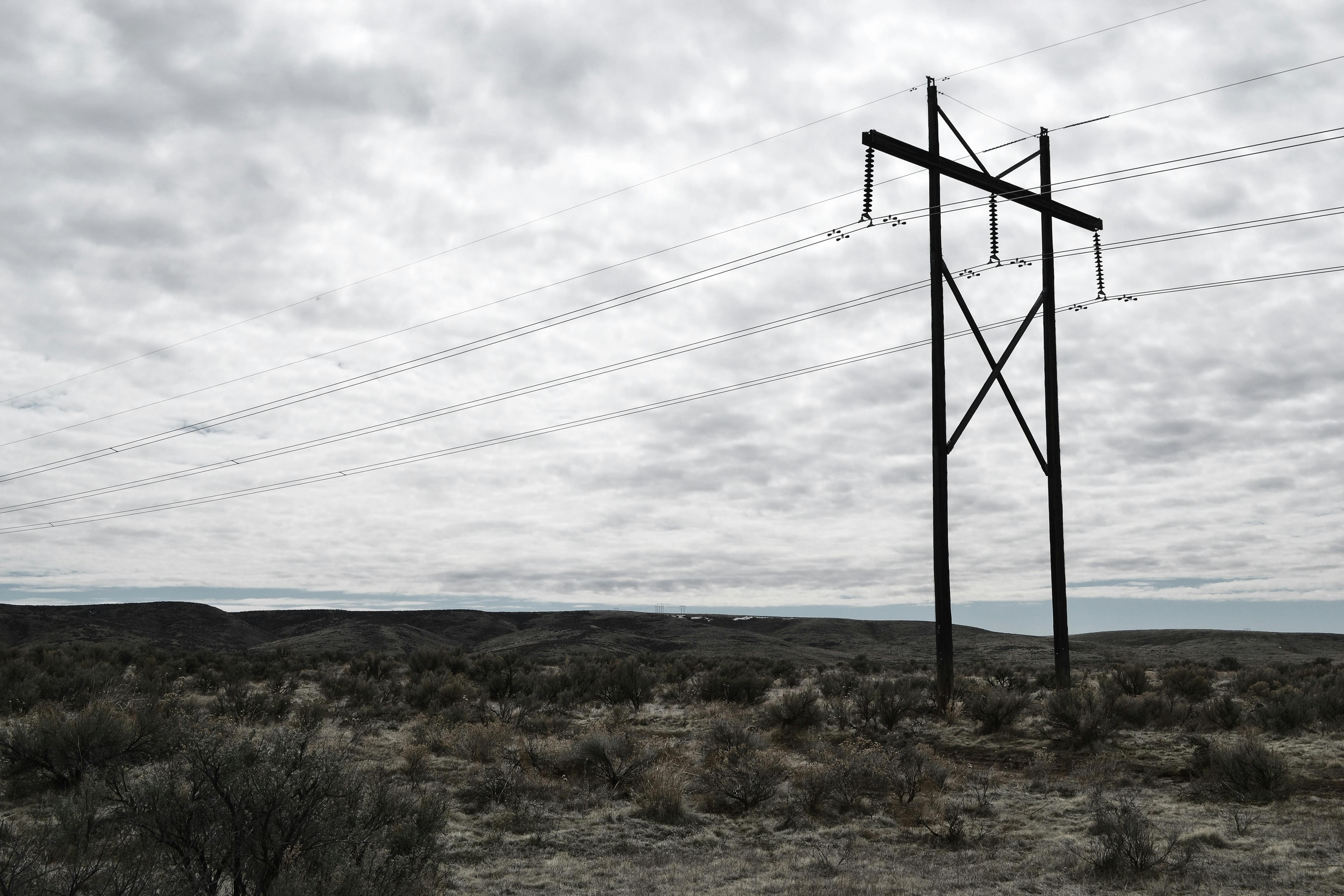 Photograph of Electrical Post on Cloudy Day · Free Stock Photo