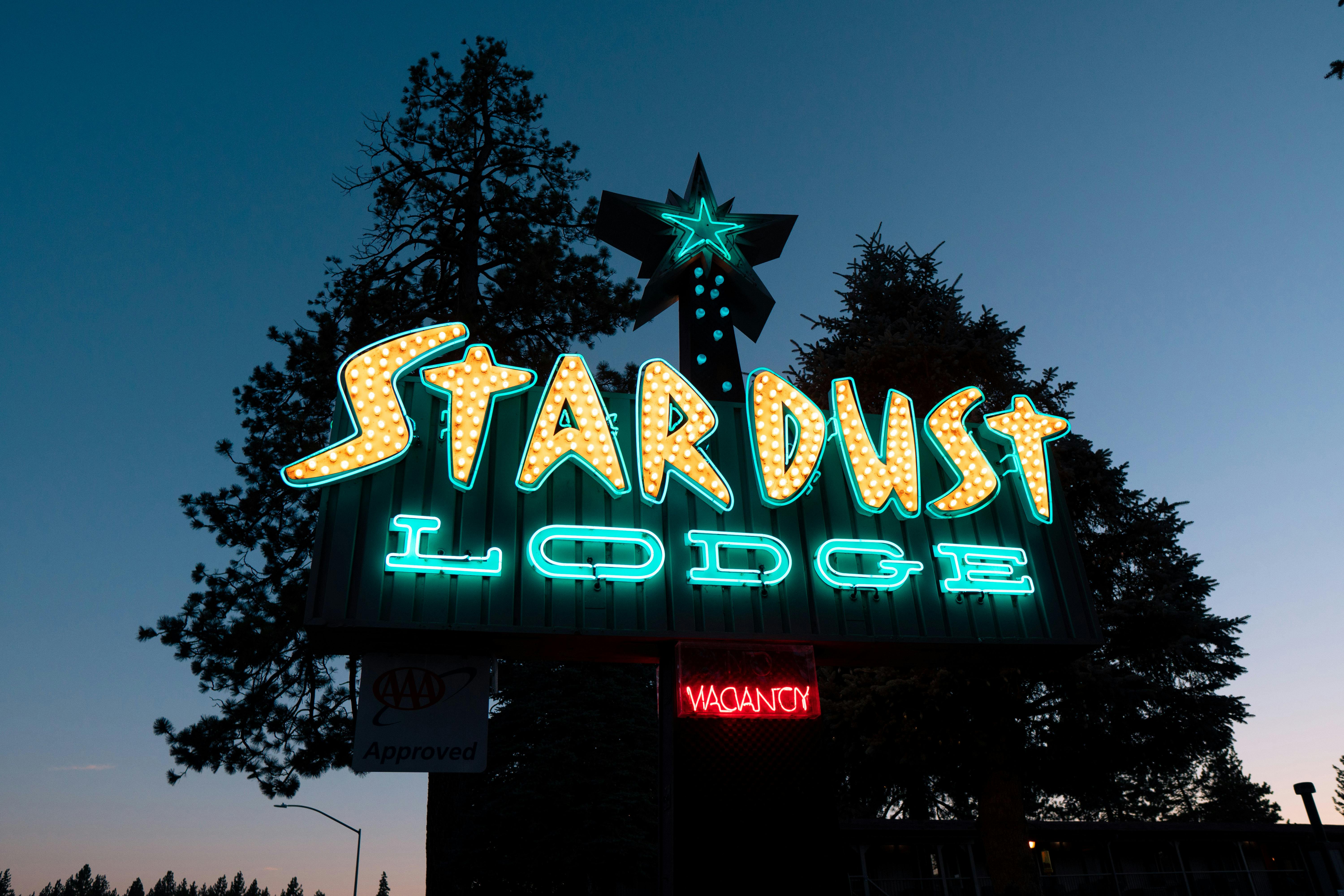 Neon Signage of Stardust Lodge · Free Stock Photo