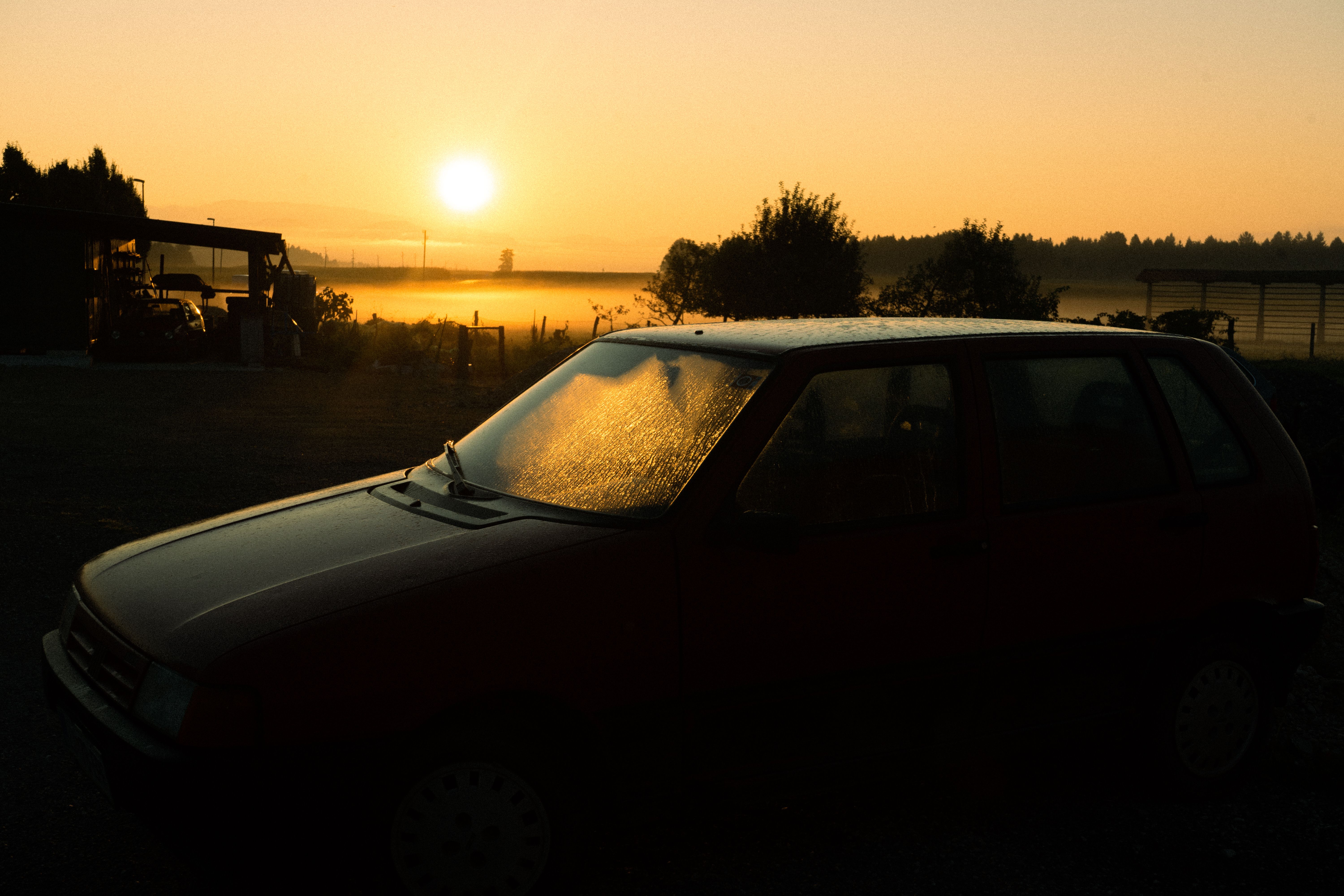 A Parked Car during the Golden Hour · Free Stock Photo
