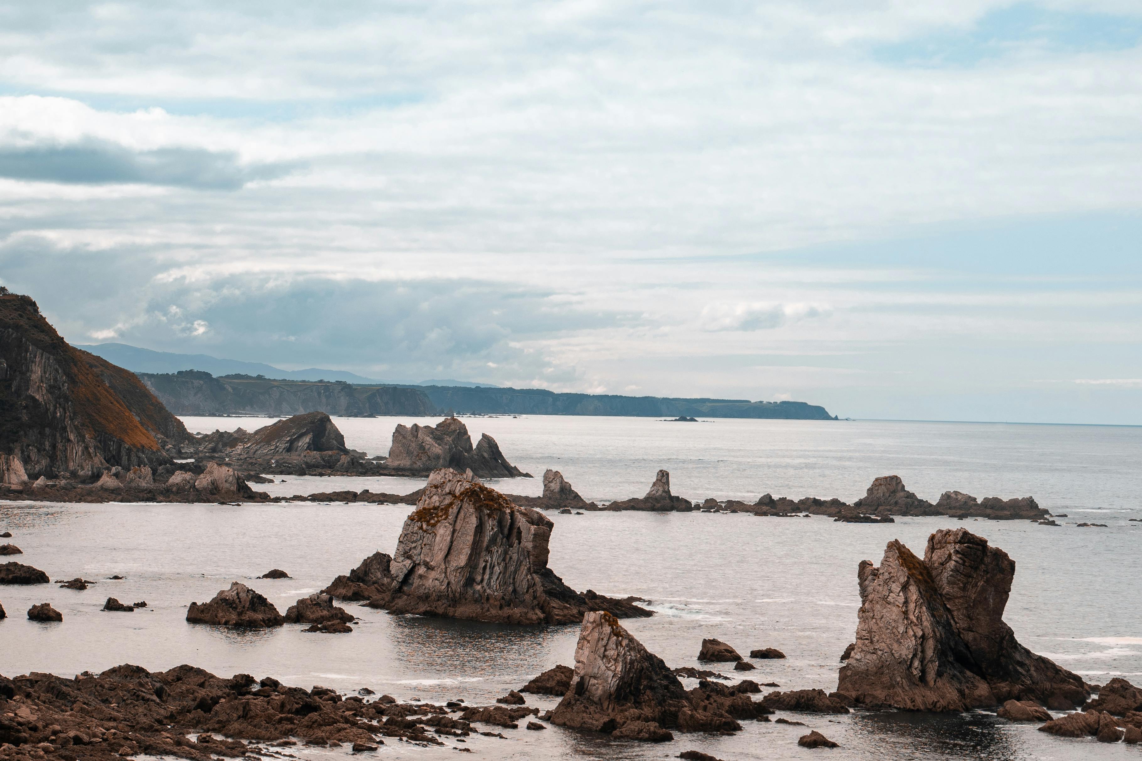 Beautiful Rocky Shore Under the Sky · Free Stock Photo