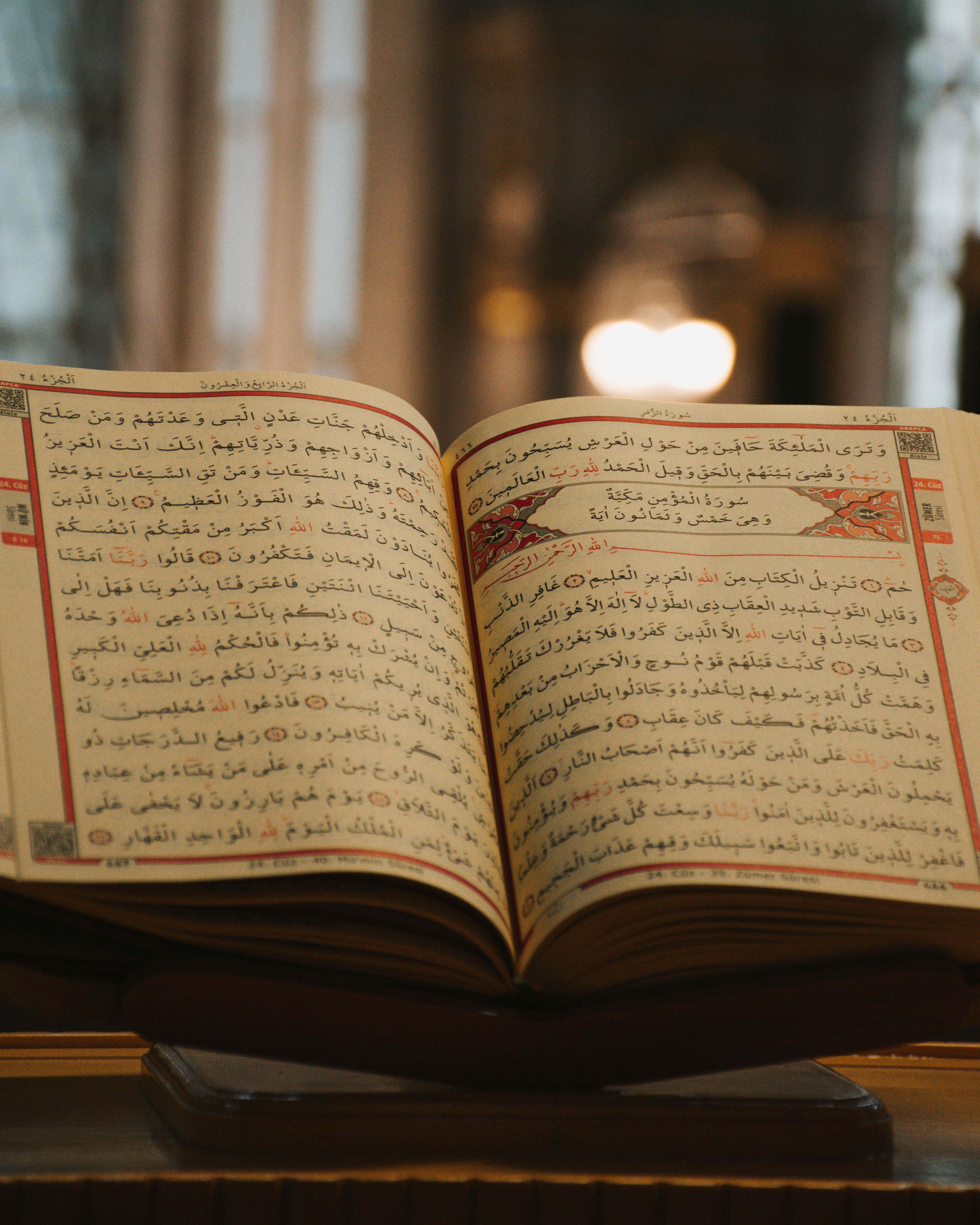 An Open Koran on a Wooden Table · Free Stock Photo