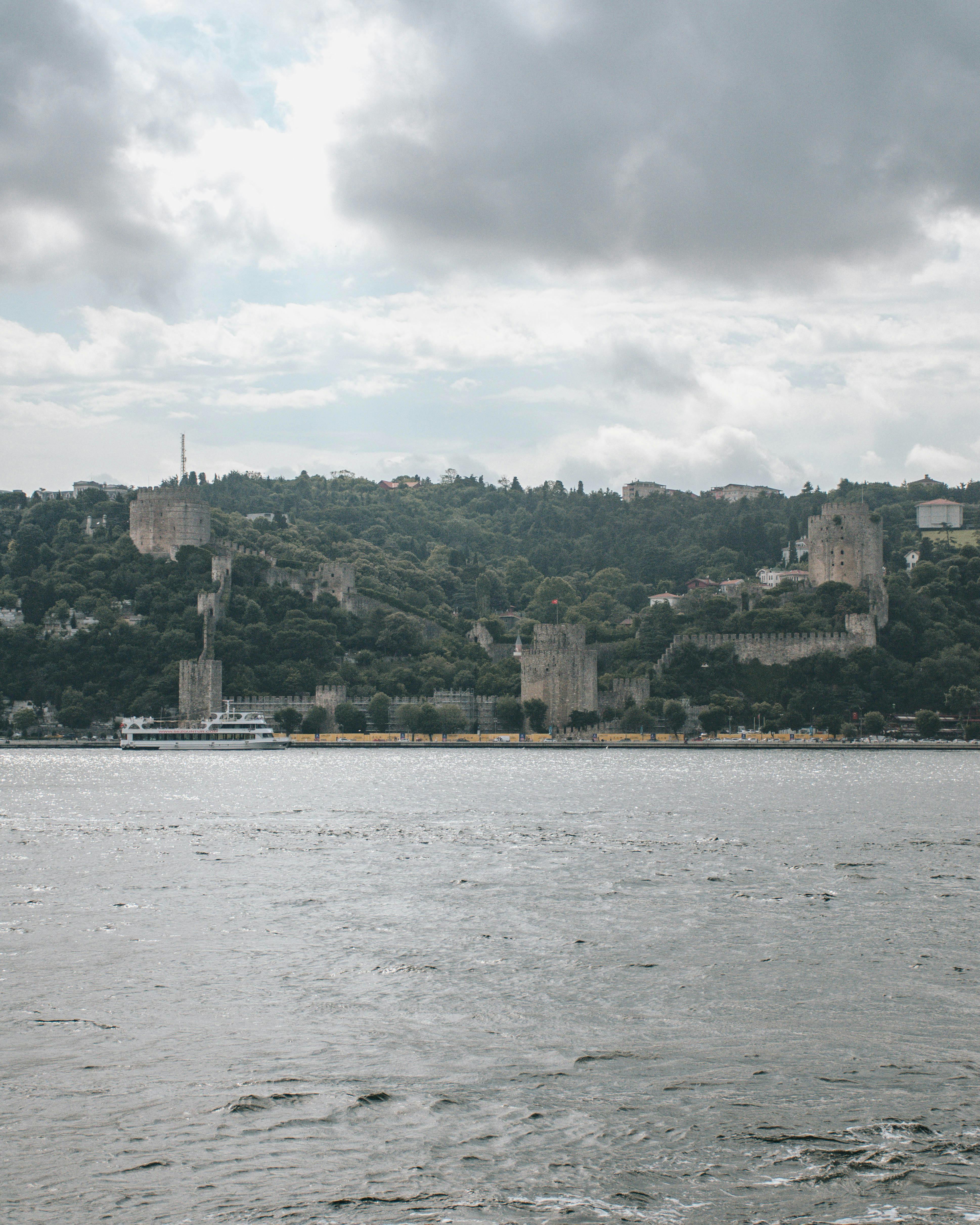 Old Castle Towers and Fortified Wall by a Sea · Free Stock Photo