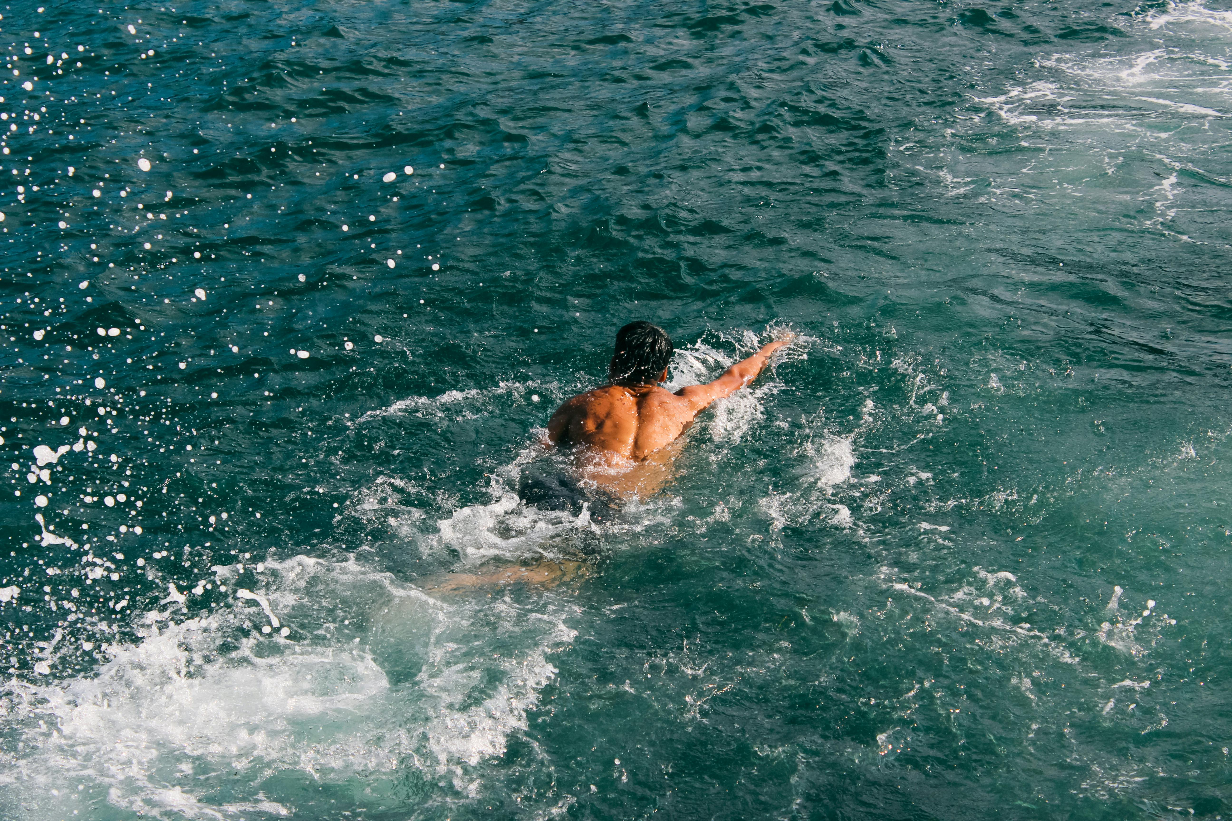 A Man Swimming in the Sea · Free Stock Photo