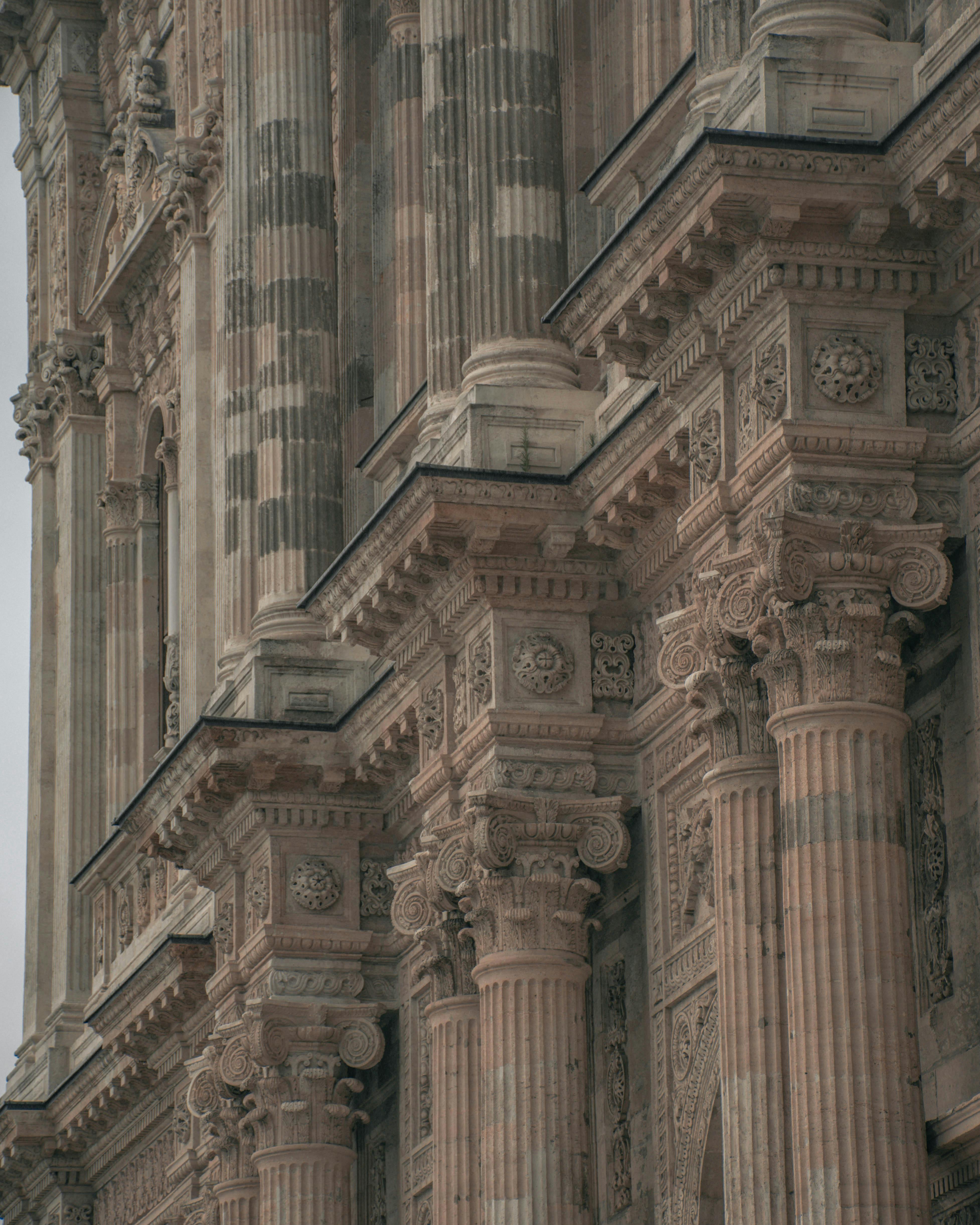 Ornamented Columns in Building · Free Stock Photo