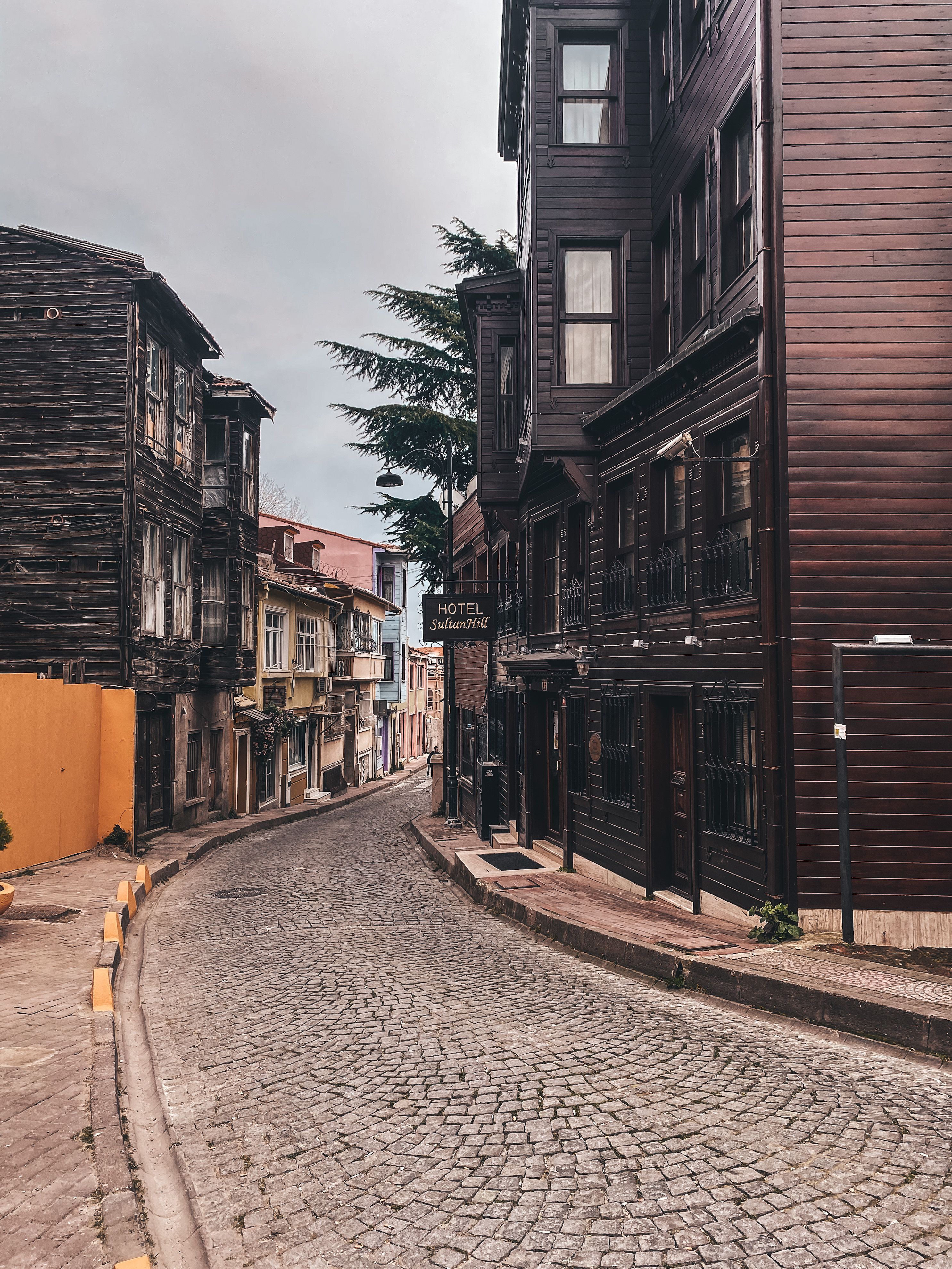 Photo of Street in Between Buildings · Free Stock Photo