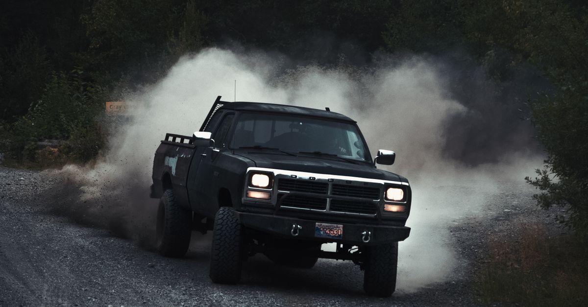 Black Pick Up Truck Driving On Off Road Free Stock Photo black-pick-up-truck-driving-on-off-road-free-stock-photo