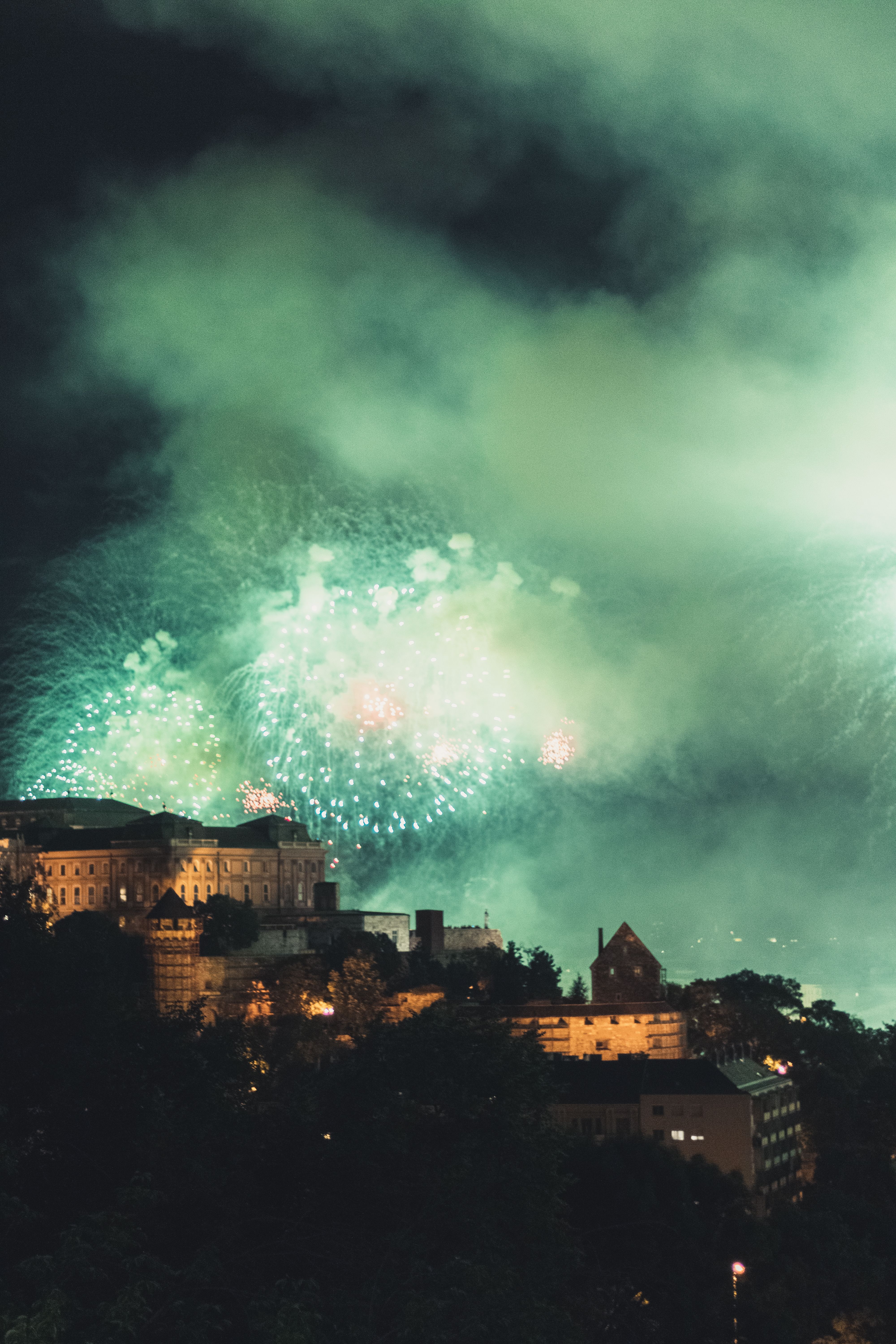Fireworks Display over City Buildings · Free Stock Photo