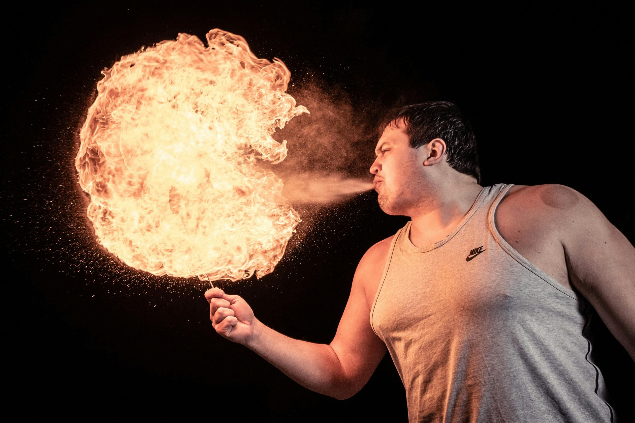 Man Spitting Fire at Night · Free Stock Photo