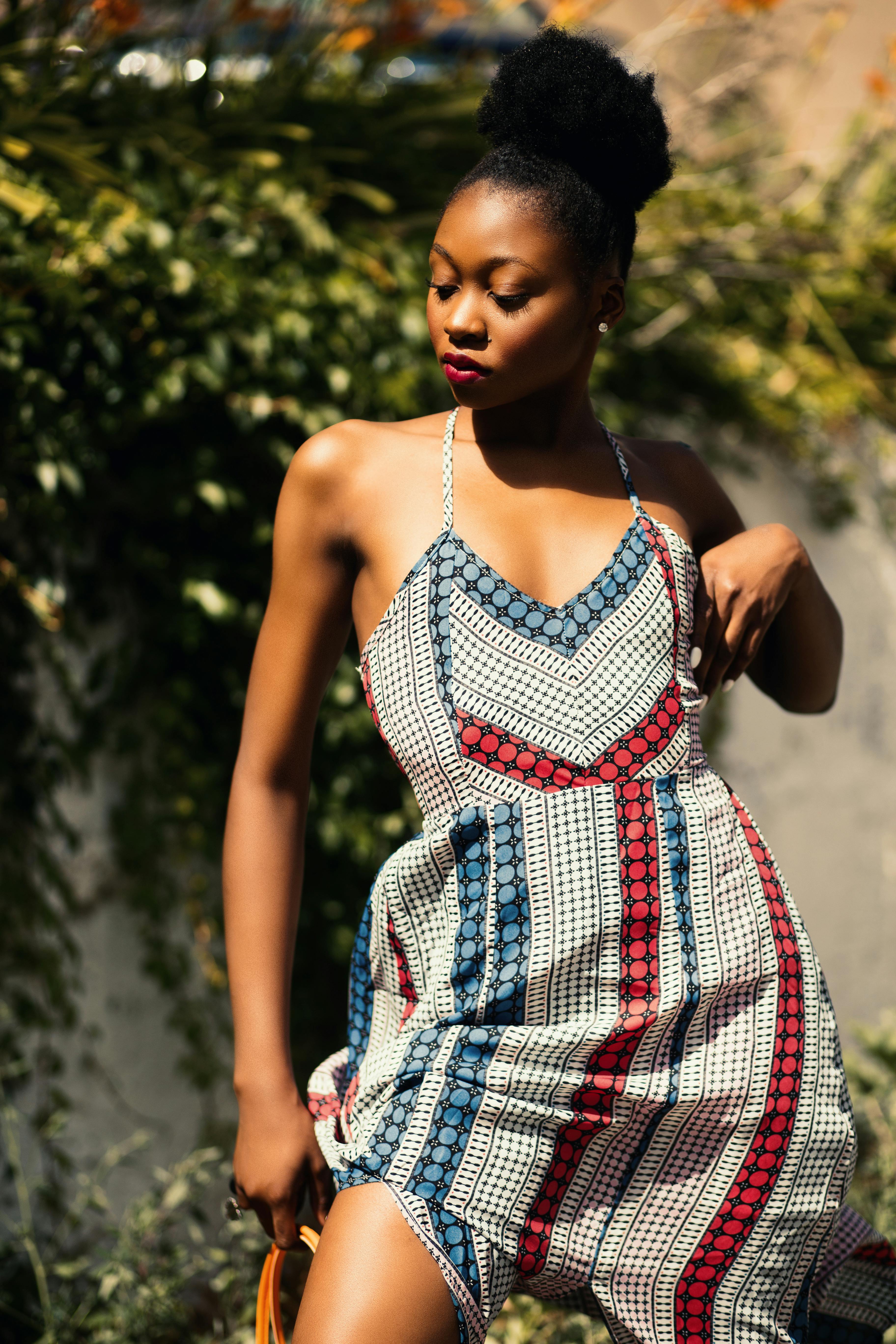 Photo of a Woman Wearing Spaghetti Strap Dress · Free Stock Photo