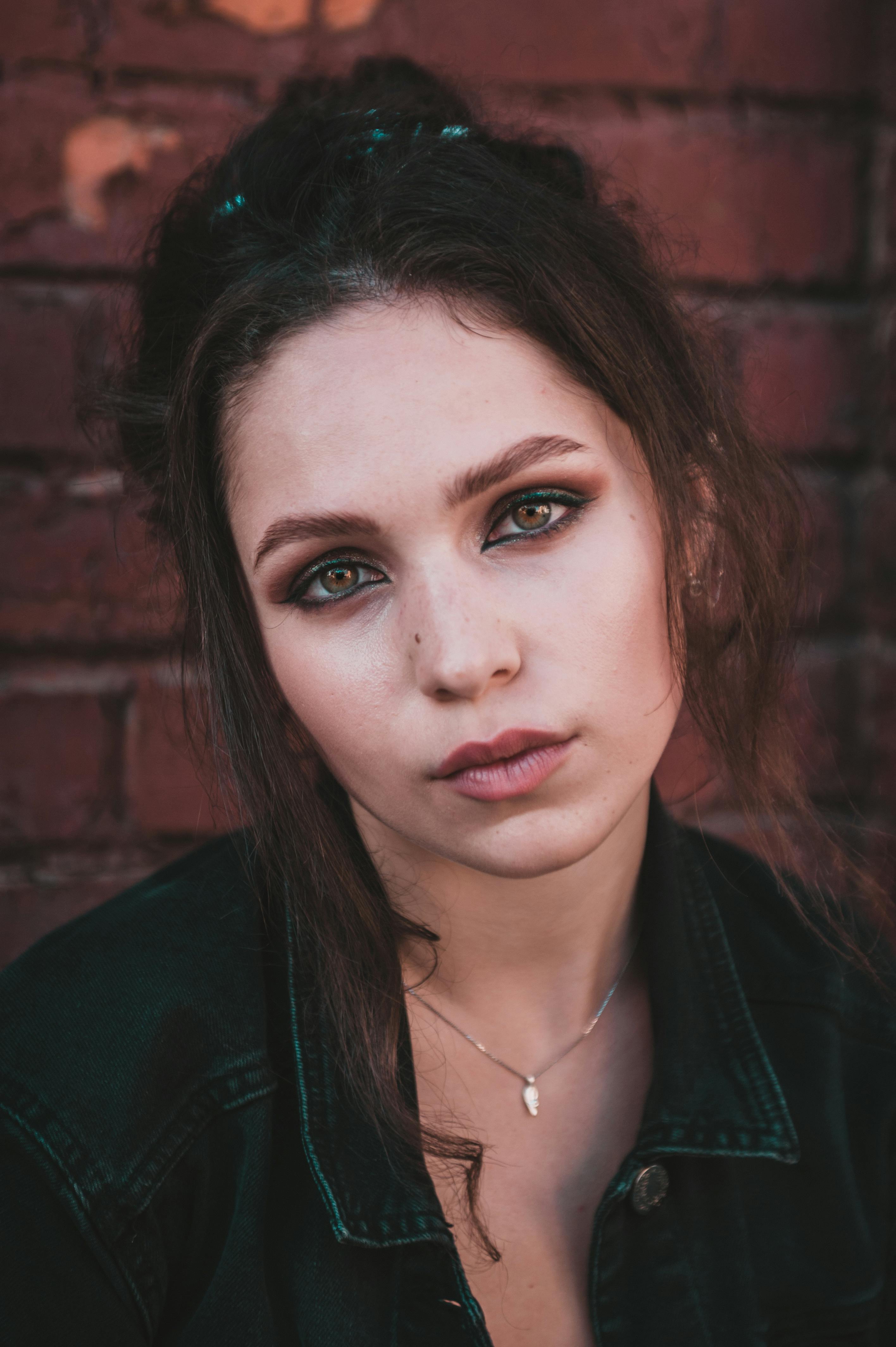 Close Up Photo of Woman Looking Away · Free Stock Photo