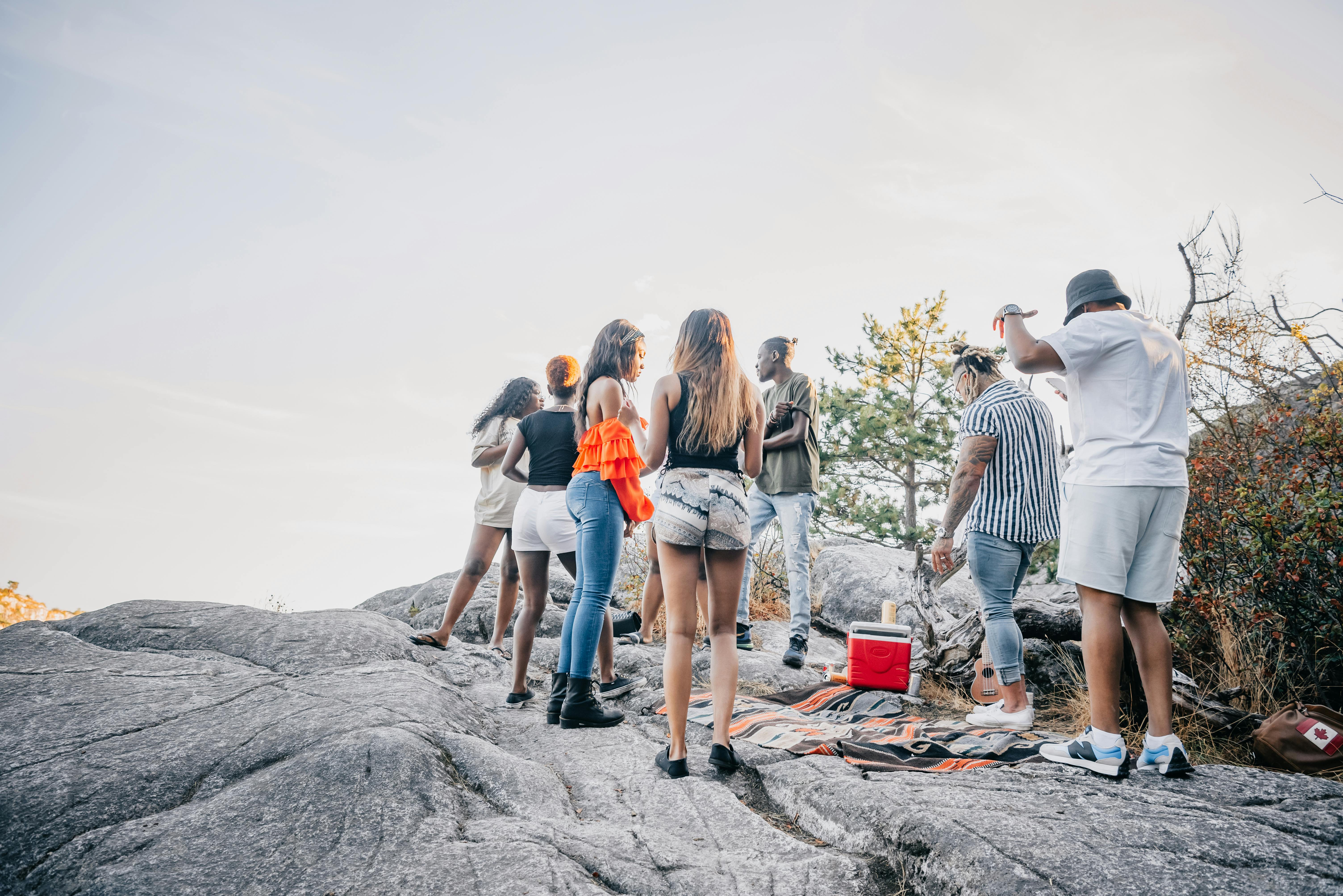 People Standing on Rock · Free Stock Photo