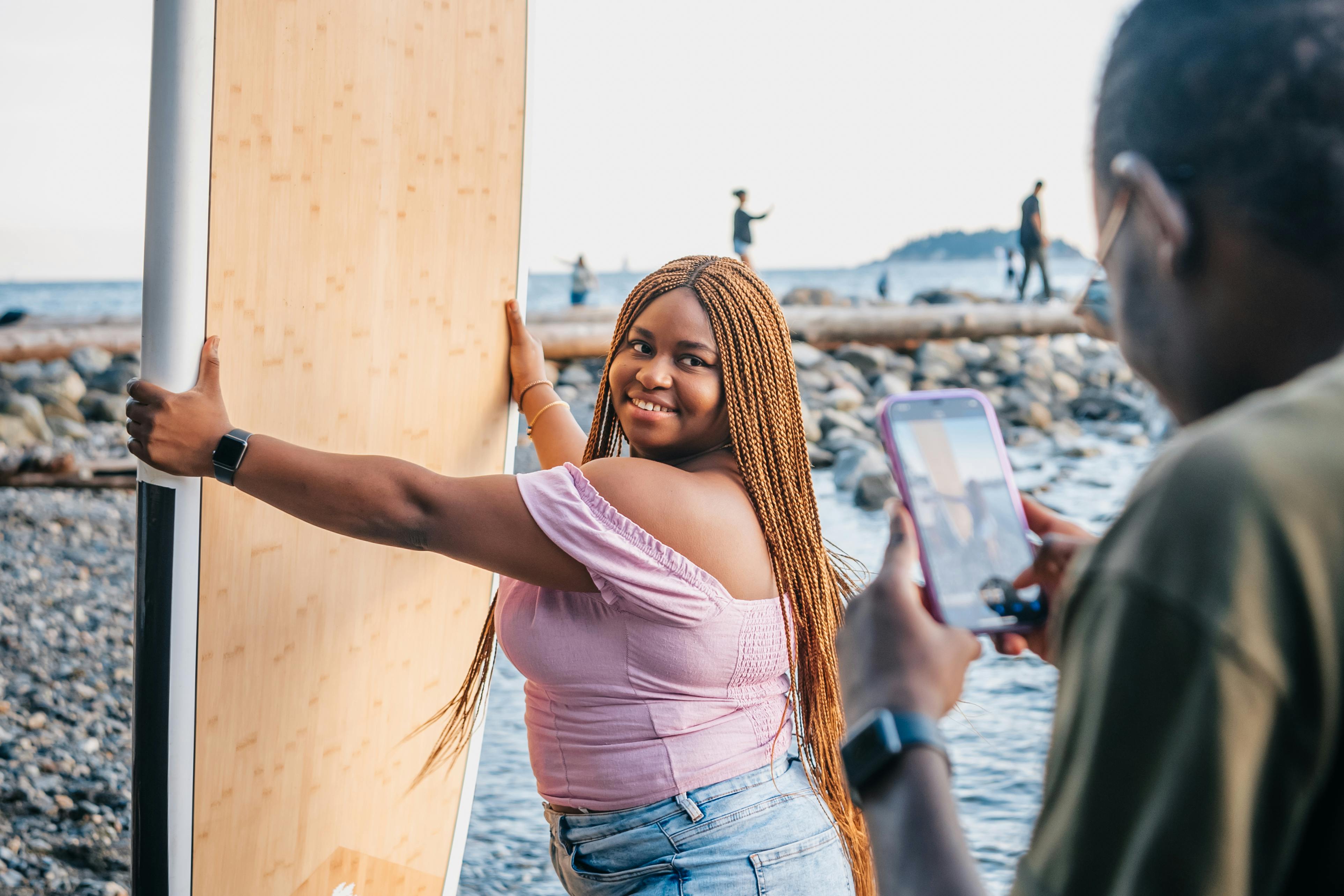 A Woman Holding a Paddle · Free Stock Photo