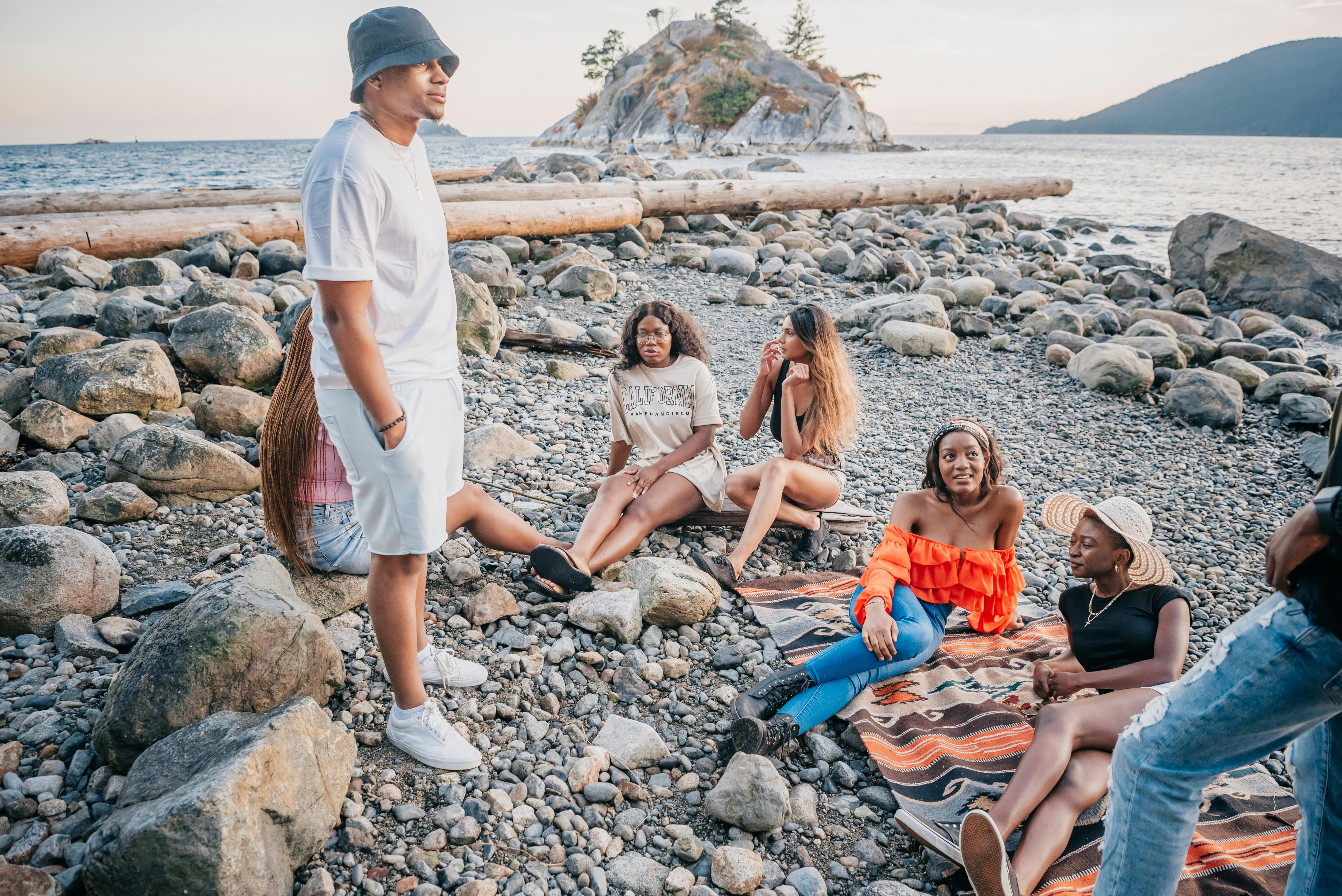 Group of Women Standing on the Beach · Free Stock Photo