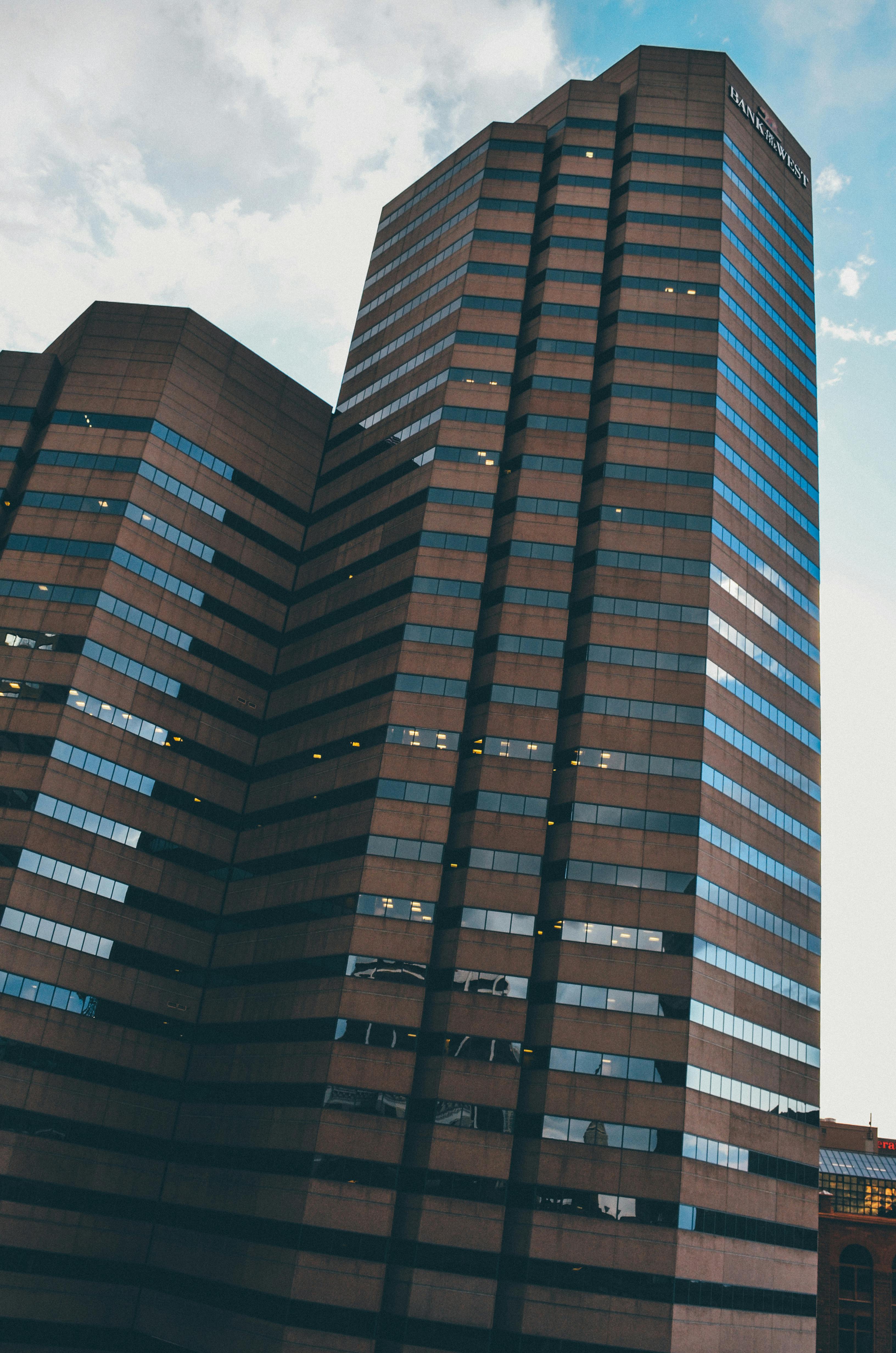 Brown Concrete High Rise Building · Free Stock Photo