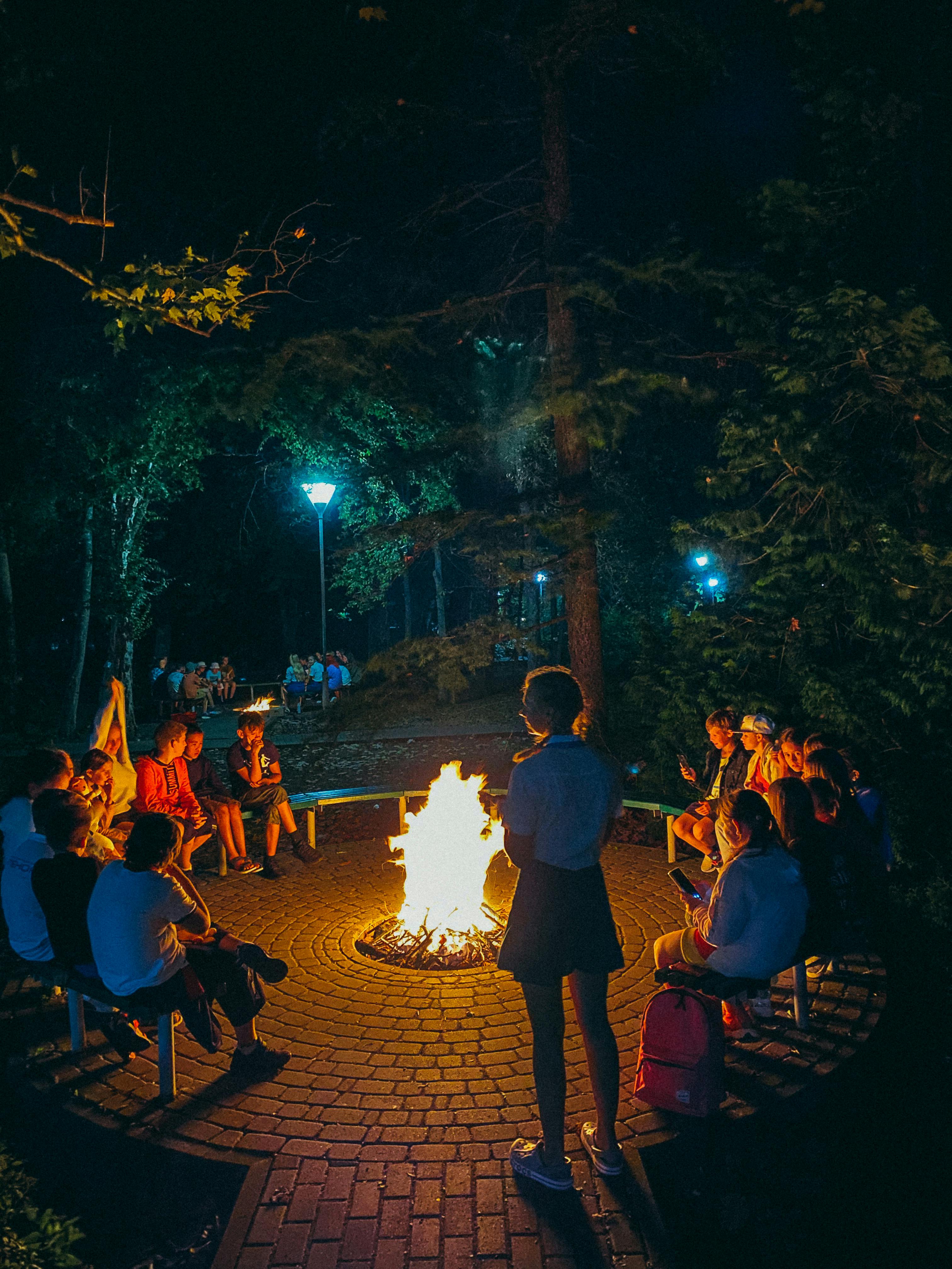 People Gathered Around the Fire Pit · Free Stock Photo