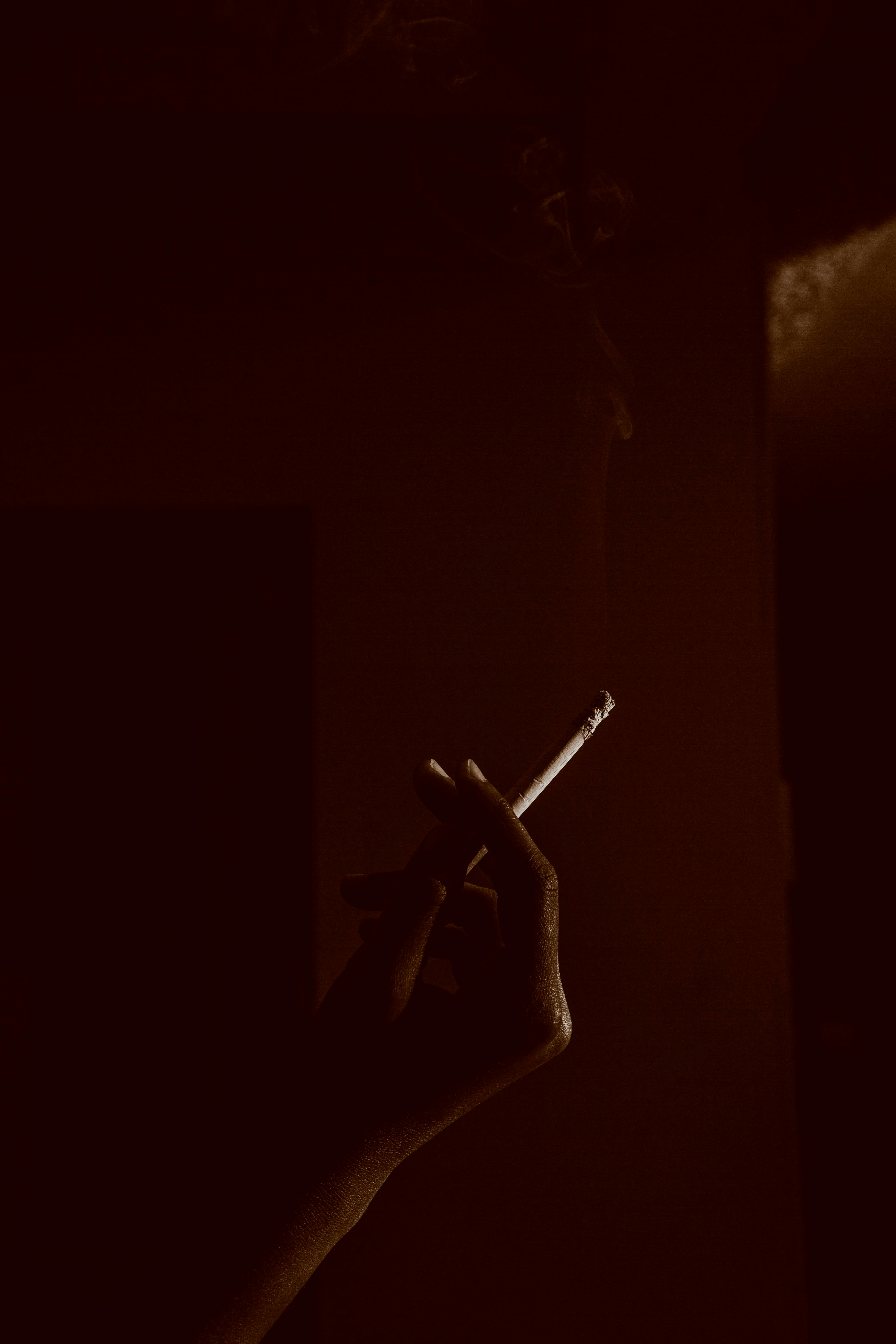 A Person Smoking Cigarette · Free Stock Photo