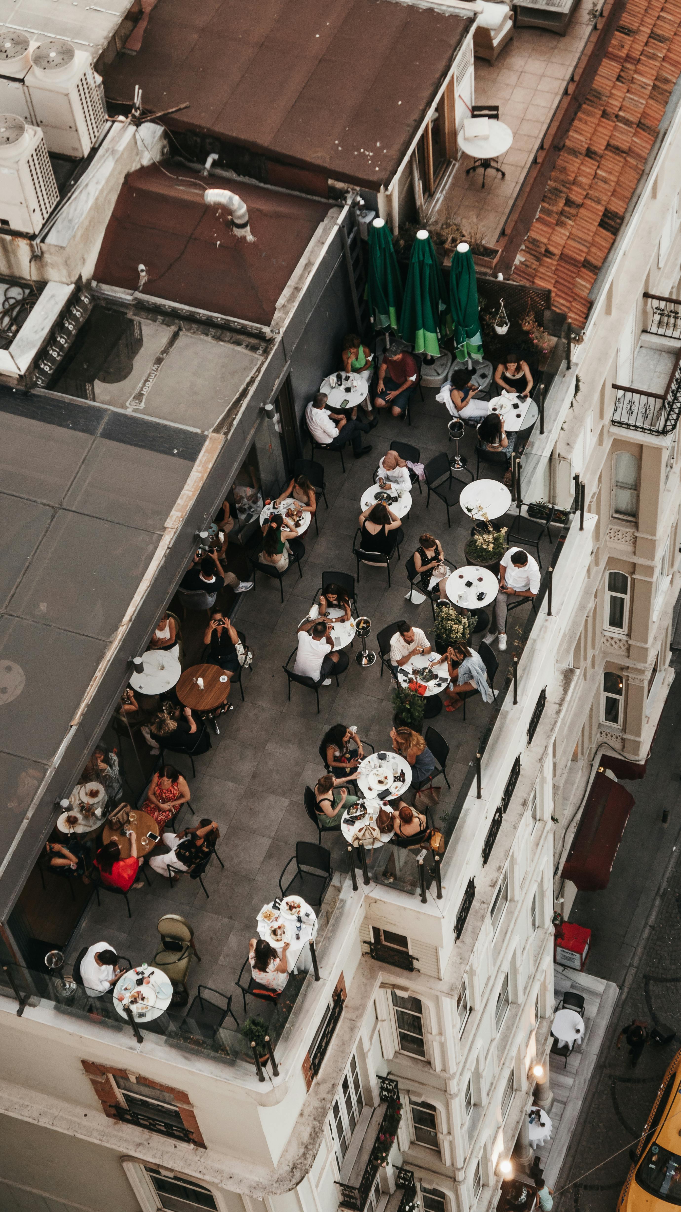 An Alfresco Restaurant on a Building Rooftop · Free Stock Photo