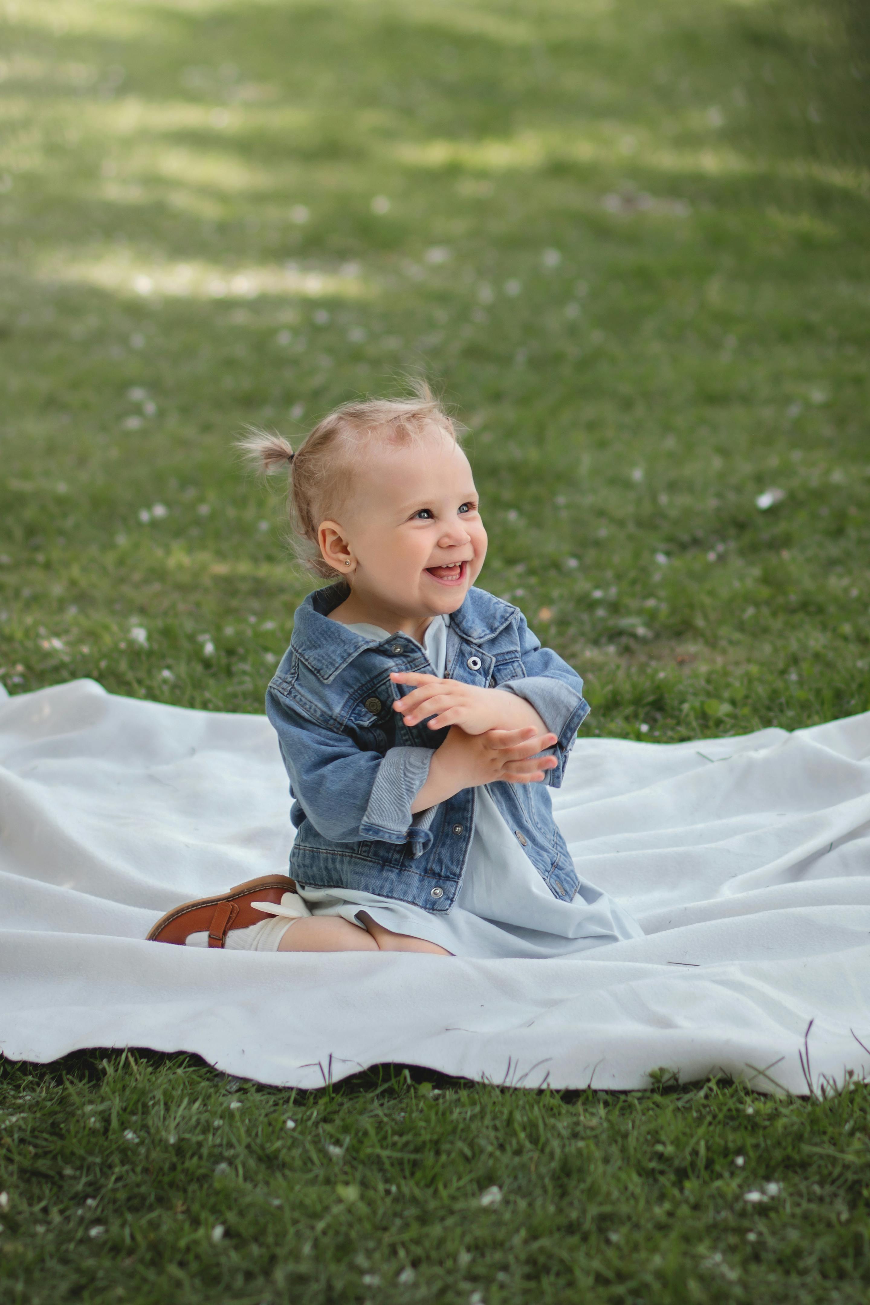 Photo of a Cute Kid in a Denim Jacket · Free Stock Photo