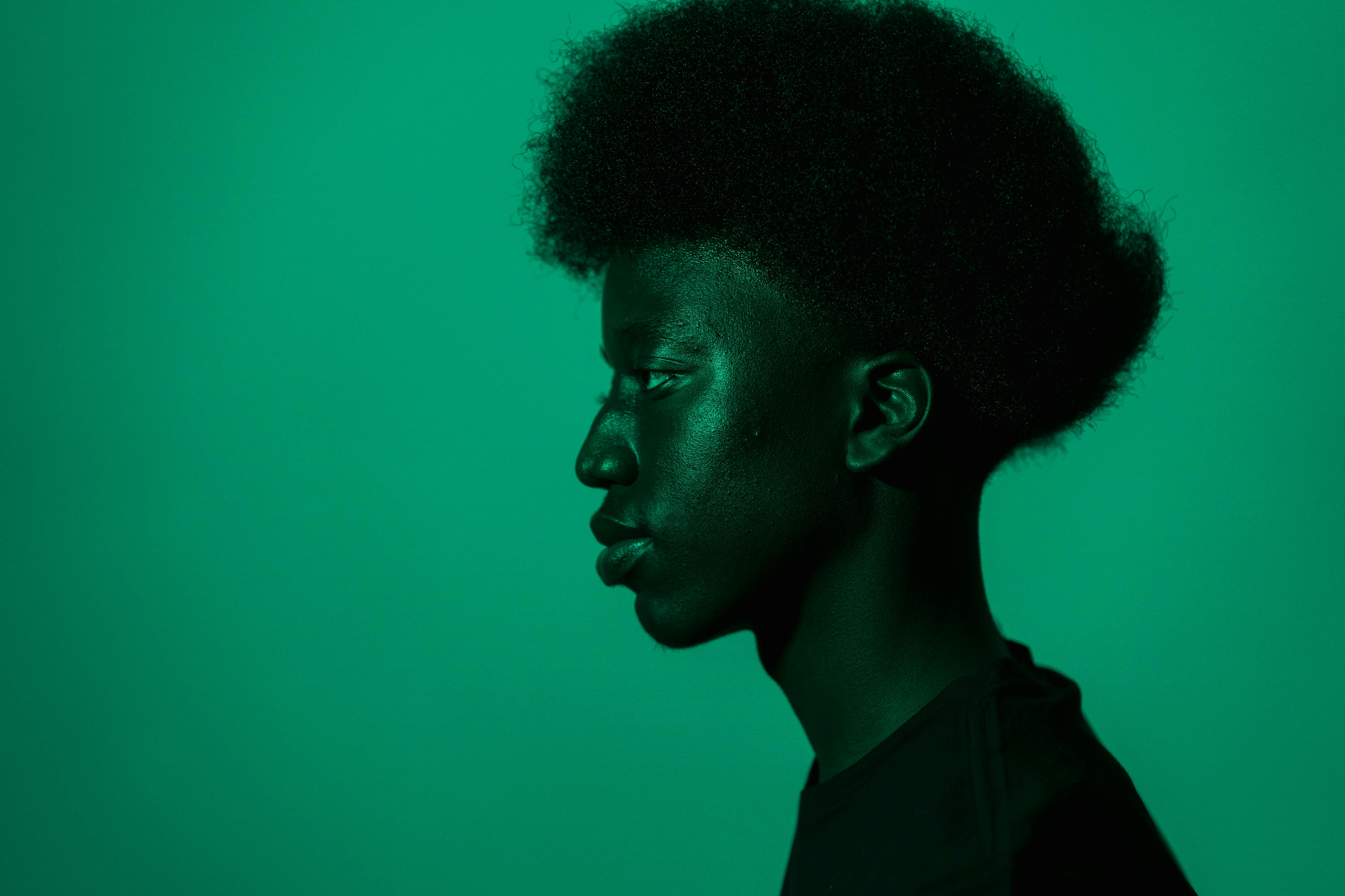 Man in Black Shirt Looking to His Left · Free Stock Photo
