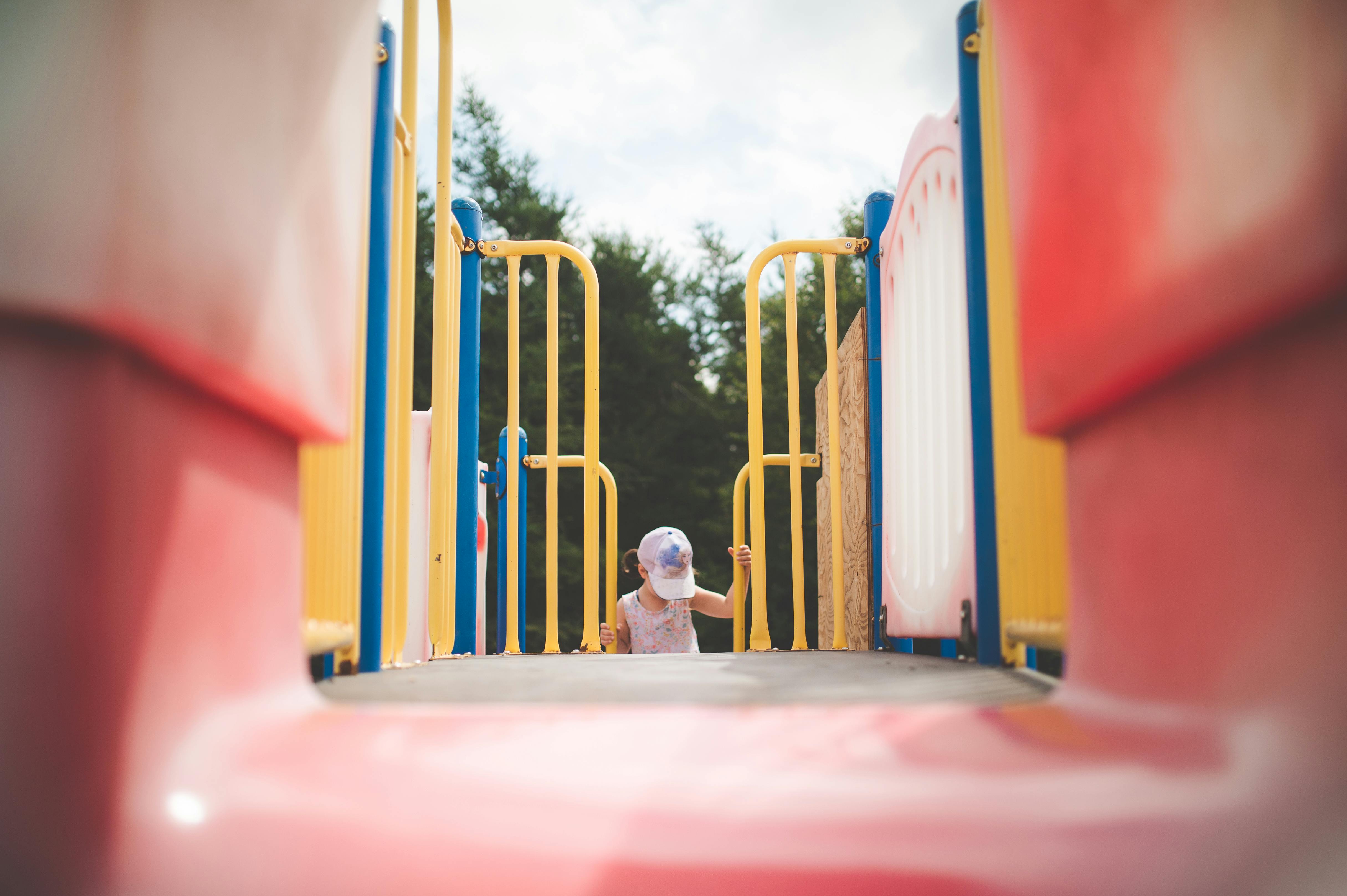 Photo of Children Playing with Stickers Outdoors · Free Stock Photo