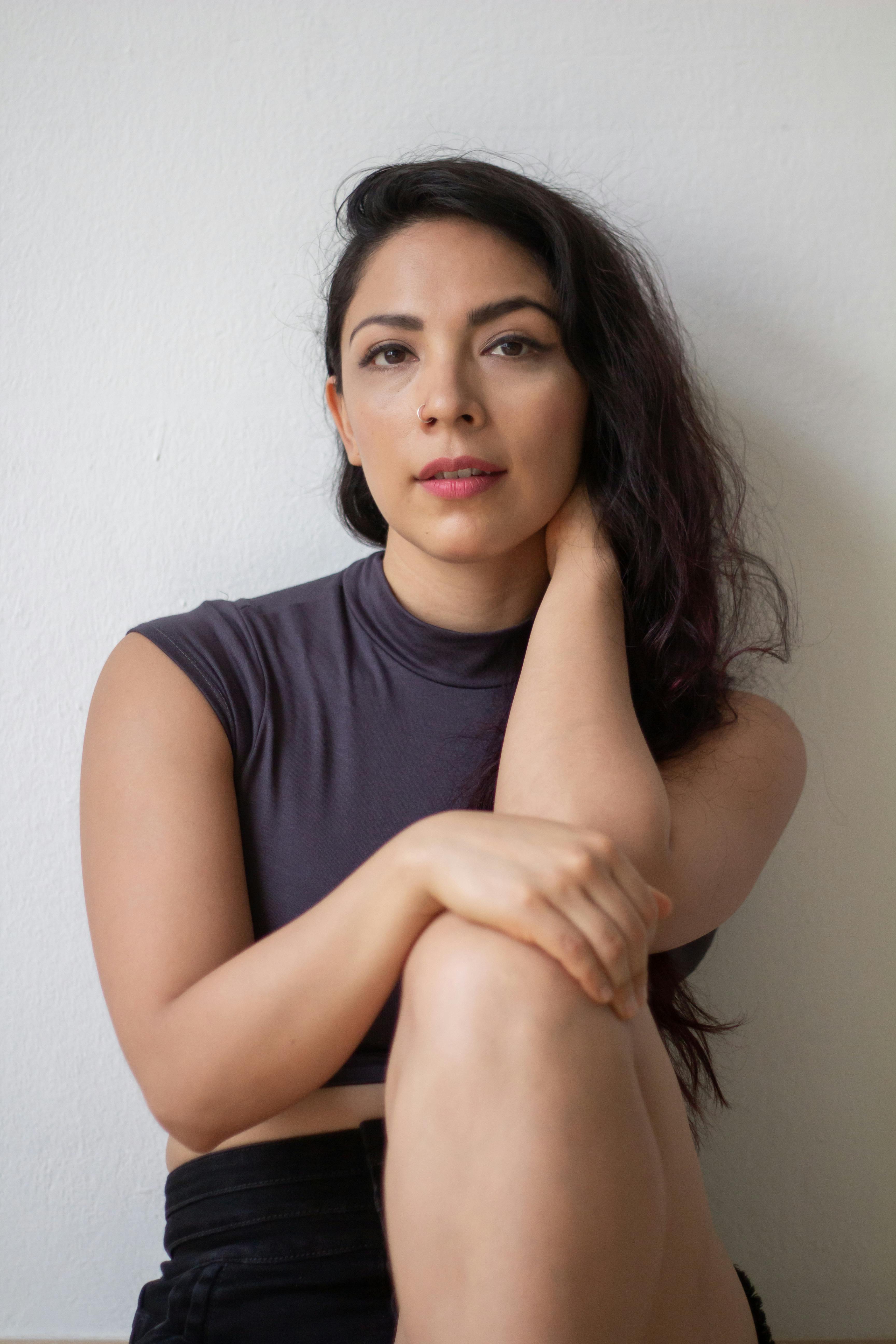 Woman in Crop Top Dancing Near Rocks · Free Stock Photo