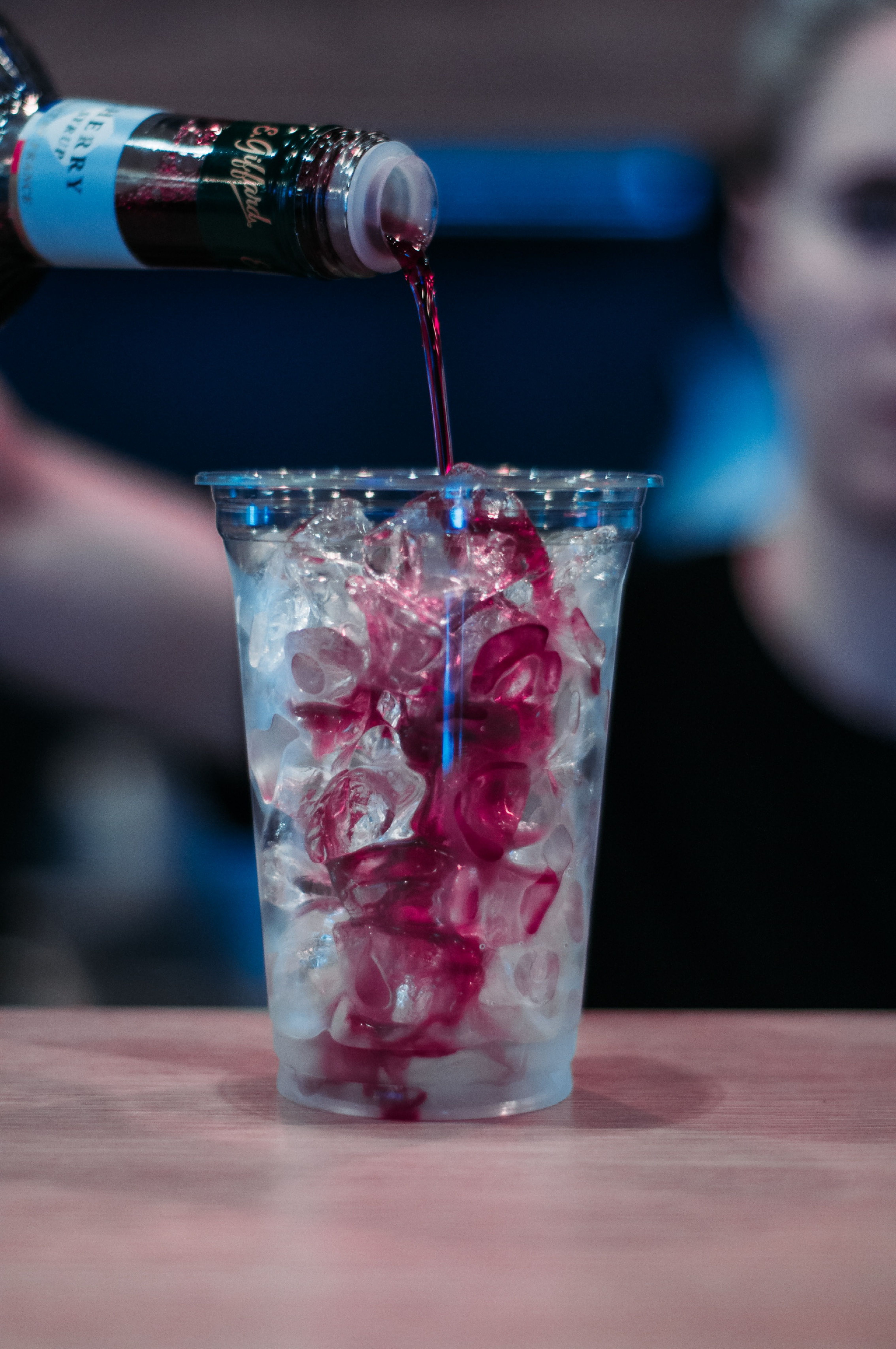 Person Holding a Drink in Close Up Photography · Free Stock Photo