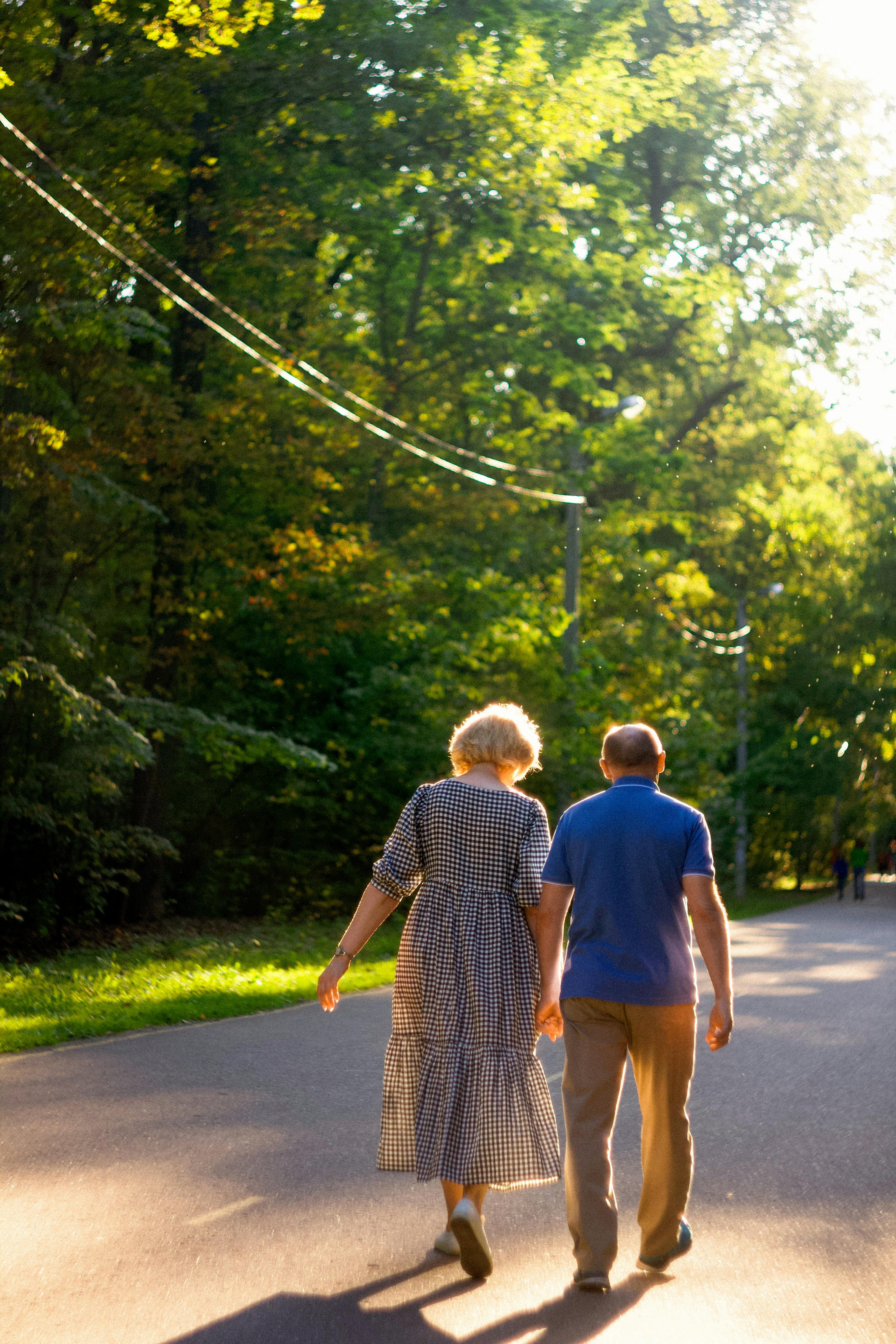Two People Standing in Forest · Free Stock Photo