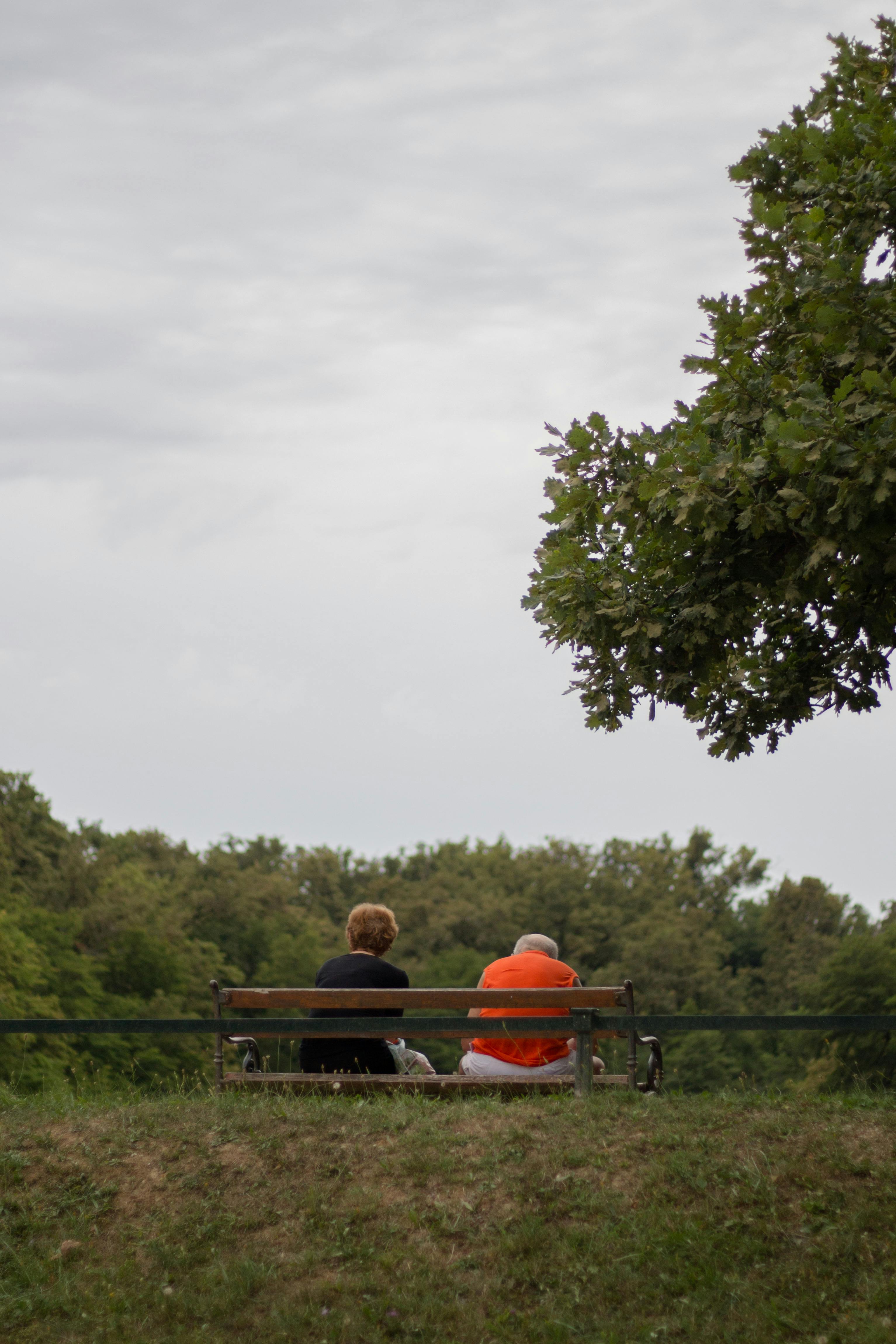 A Couple Sitting on the Bench · Free Stock Photo