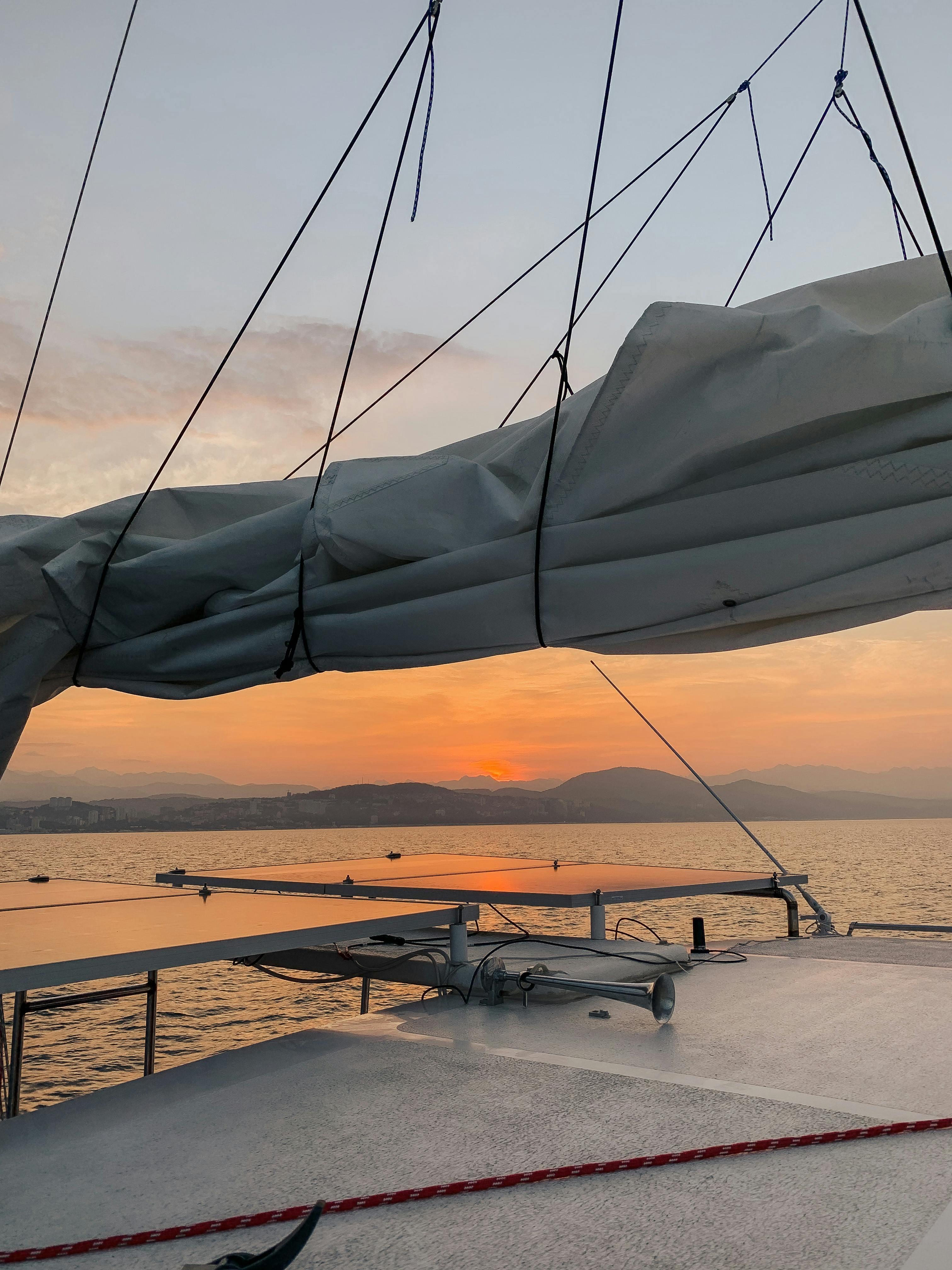 Sail Hanging on Ropes Above the Deck · Free Stock Photo