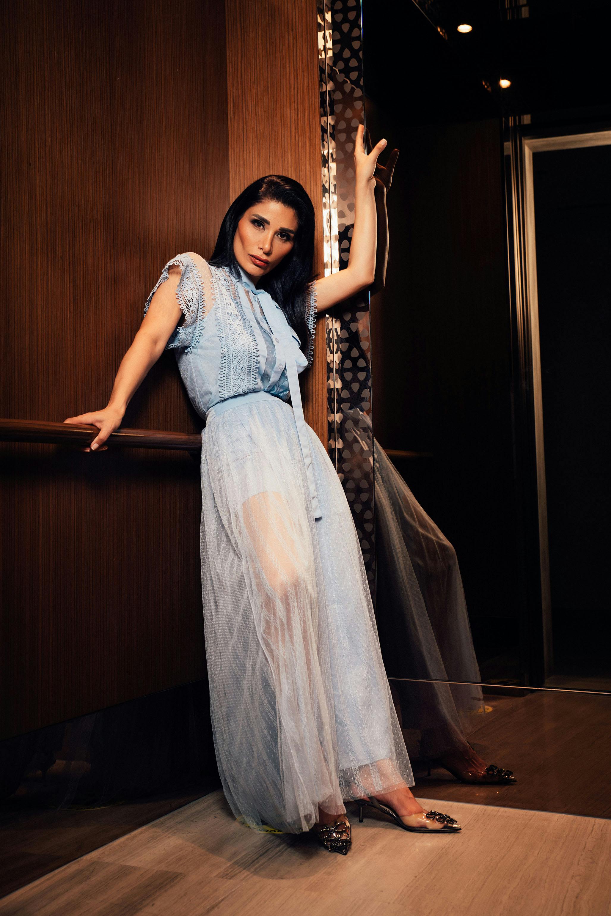 A Woman Wearing a Sheer Dress · Free Stock Photo