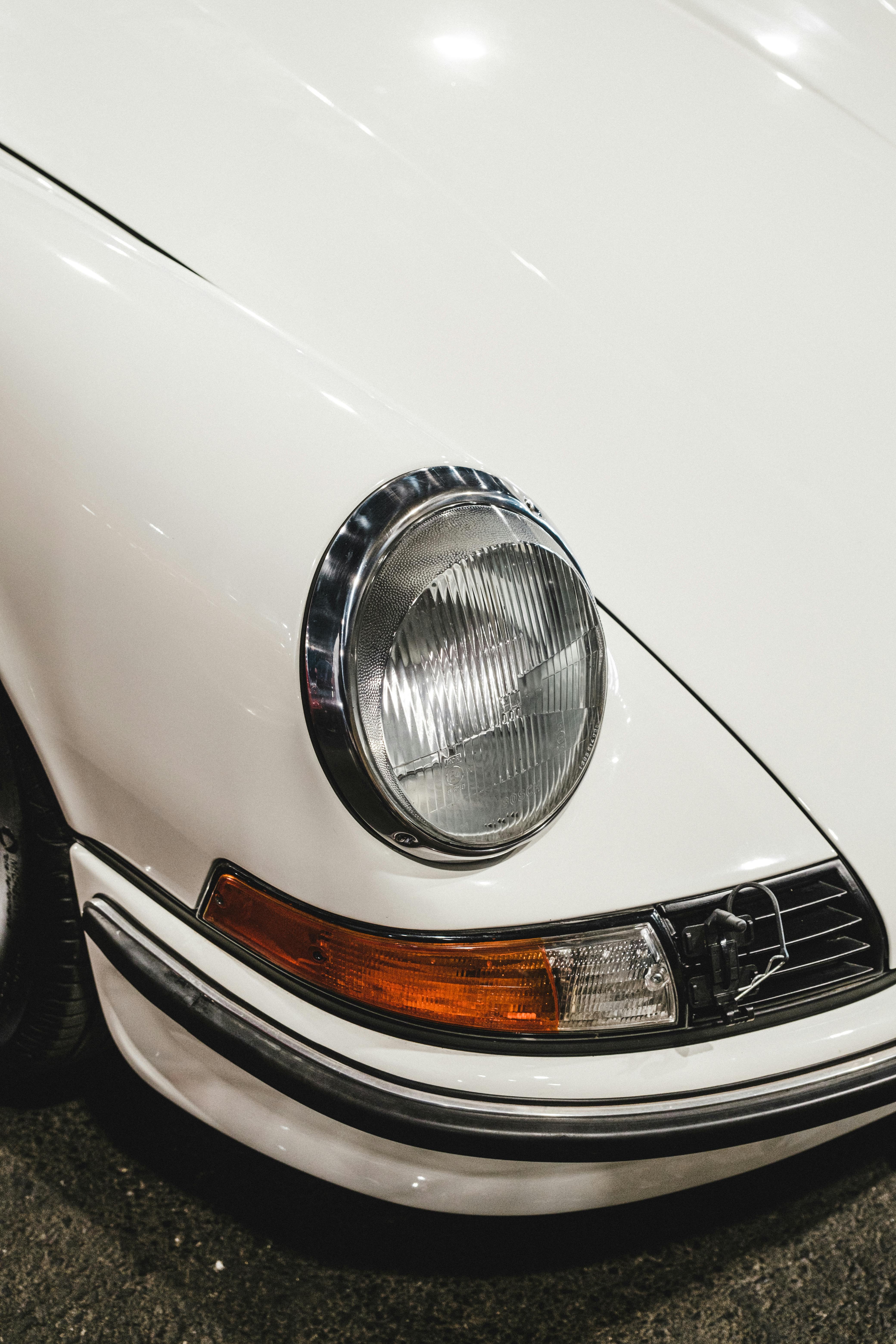 Close Up Photo of Car Headlight · Free Stock Photo