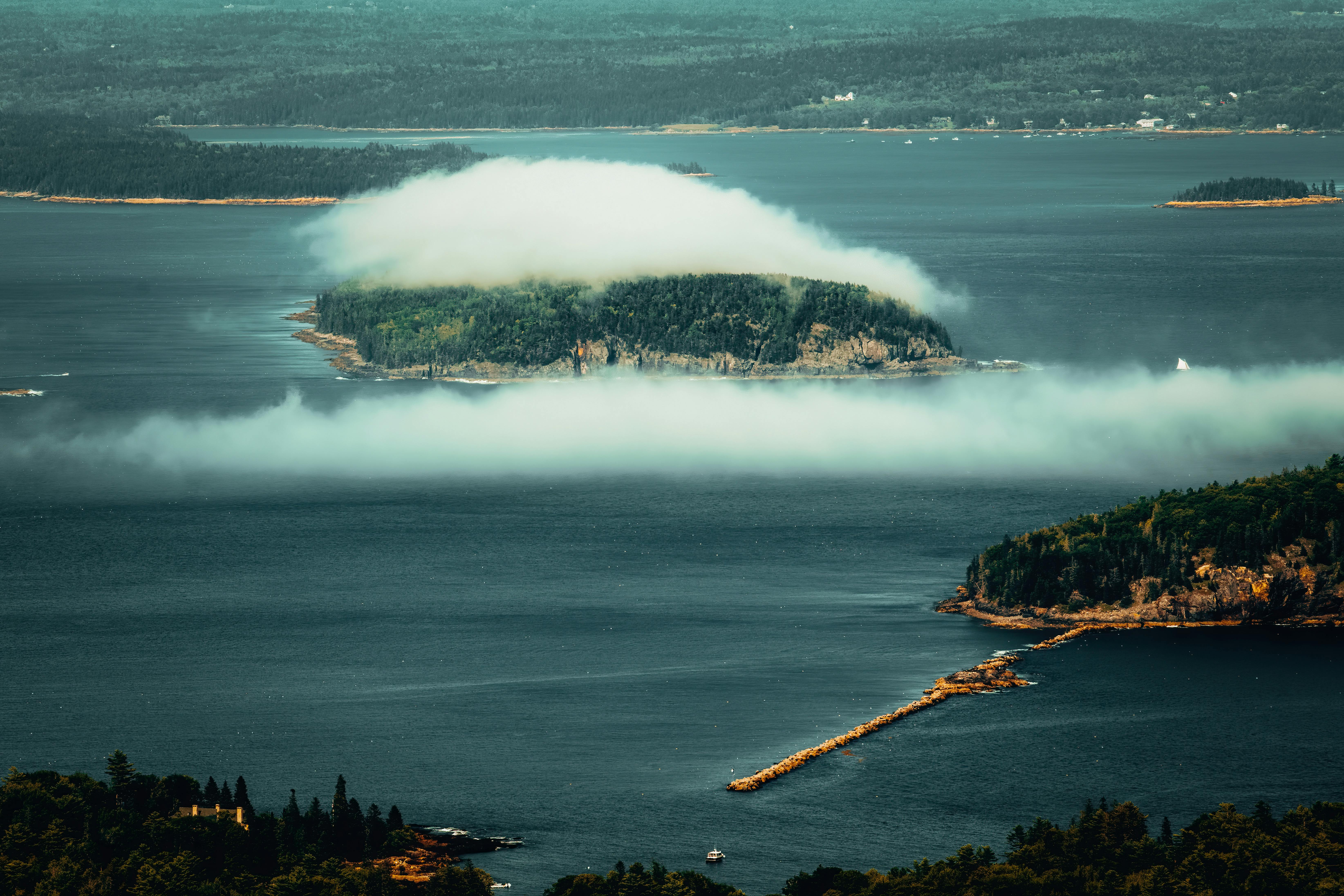 Clouds over Island near Shore · Free Stock Photo