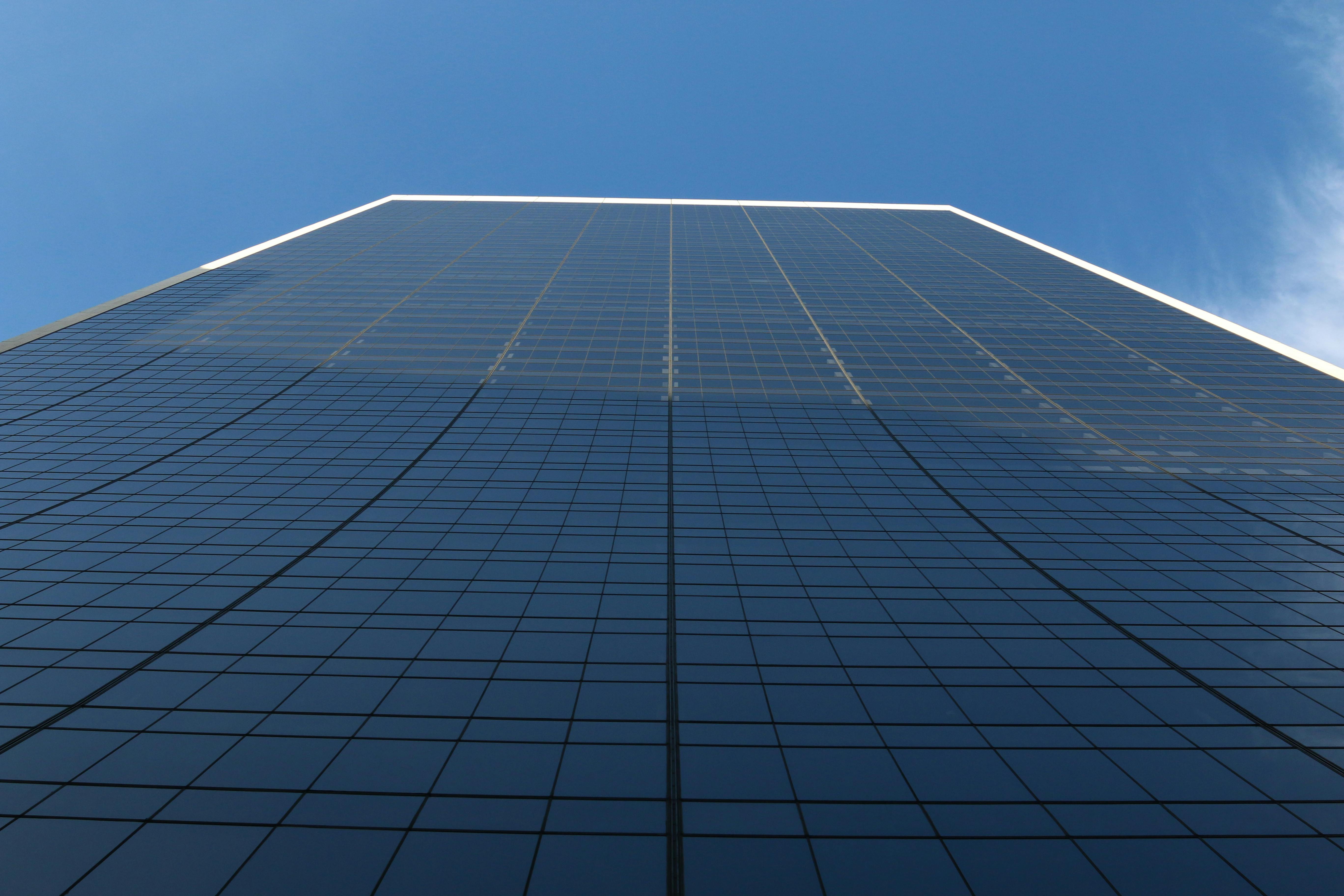 White Wooden Framed Glass Window on Wall Beside Windows with Louver ...