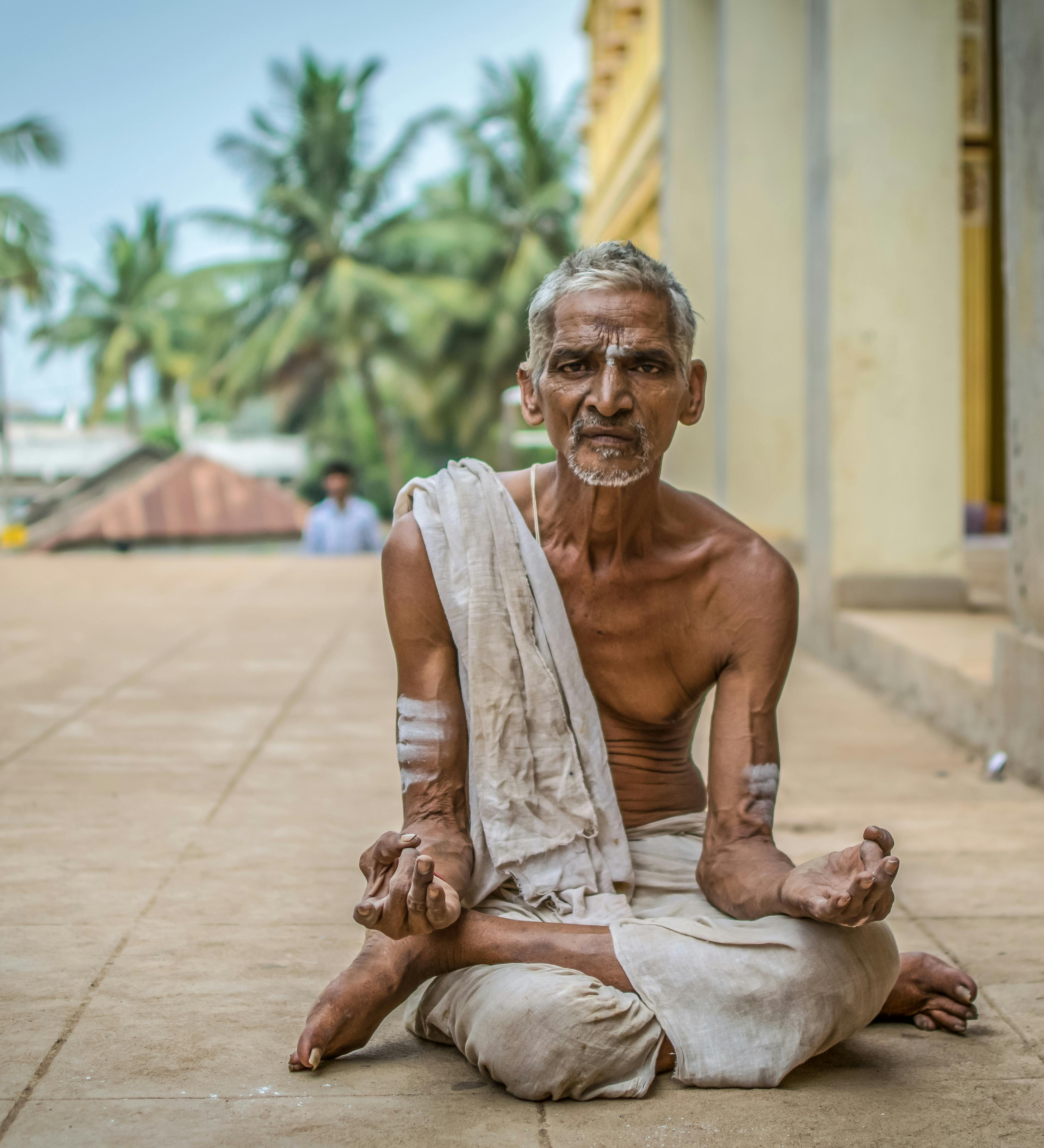 Man Meditating at Daytime · Free Stock Photo