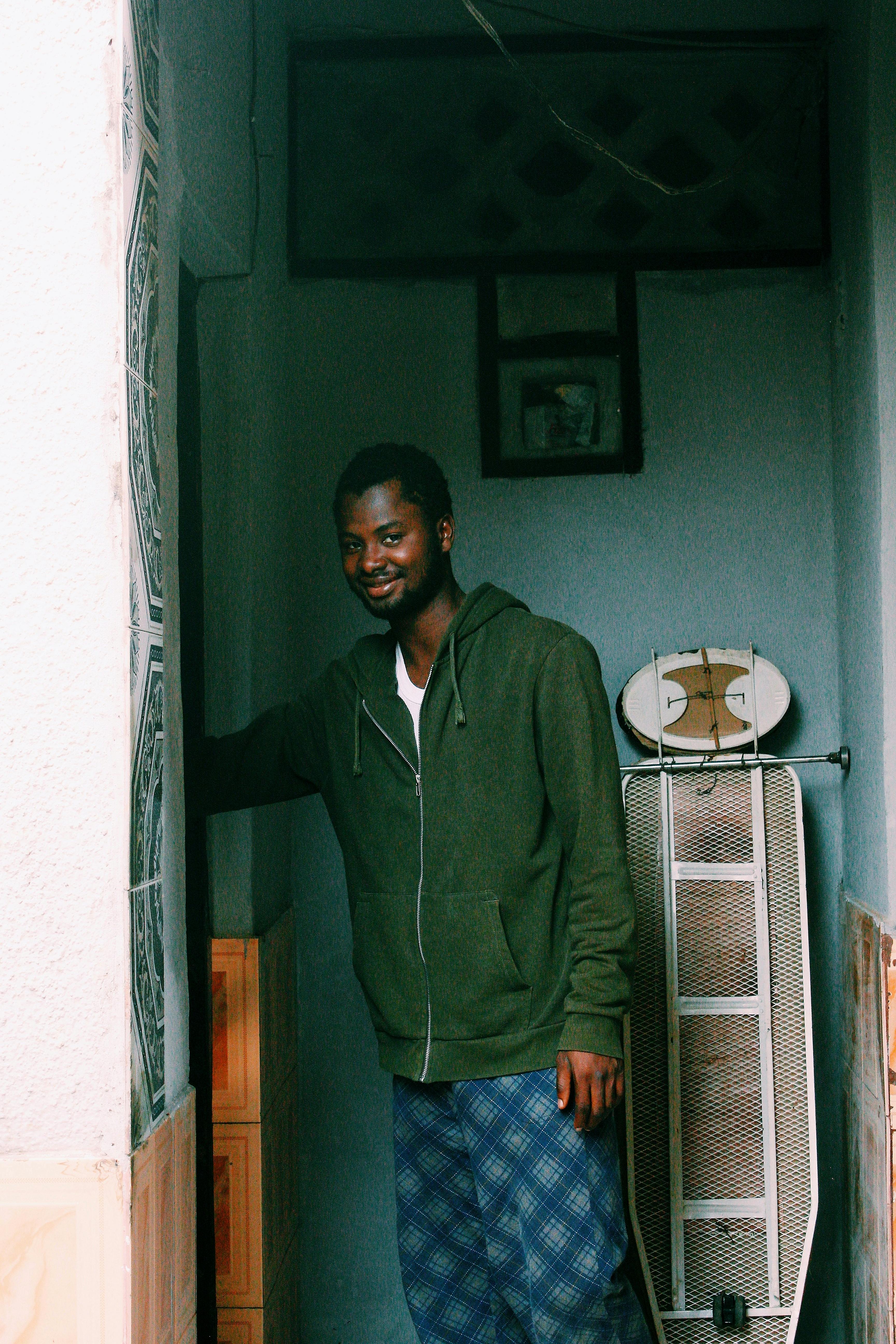 Portrait of an African Man in Dark Room · Free Stock Photo