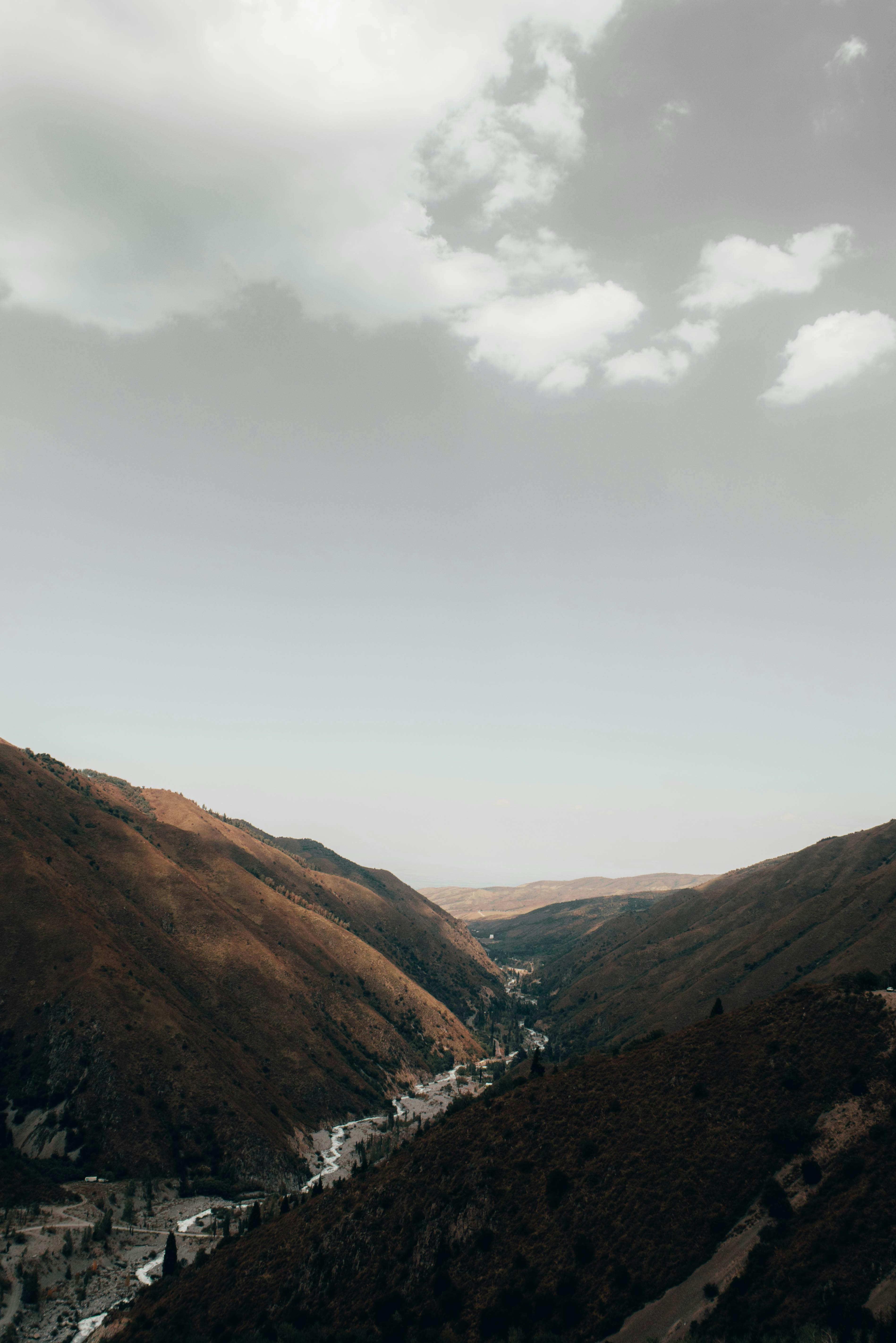 Brown Rock Building Under Gray Sky · Free Stock Photo