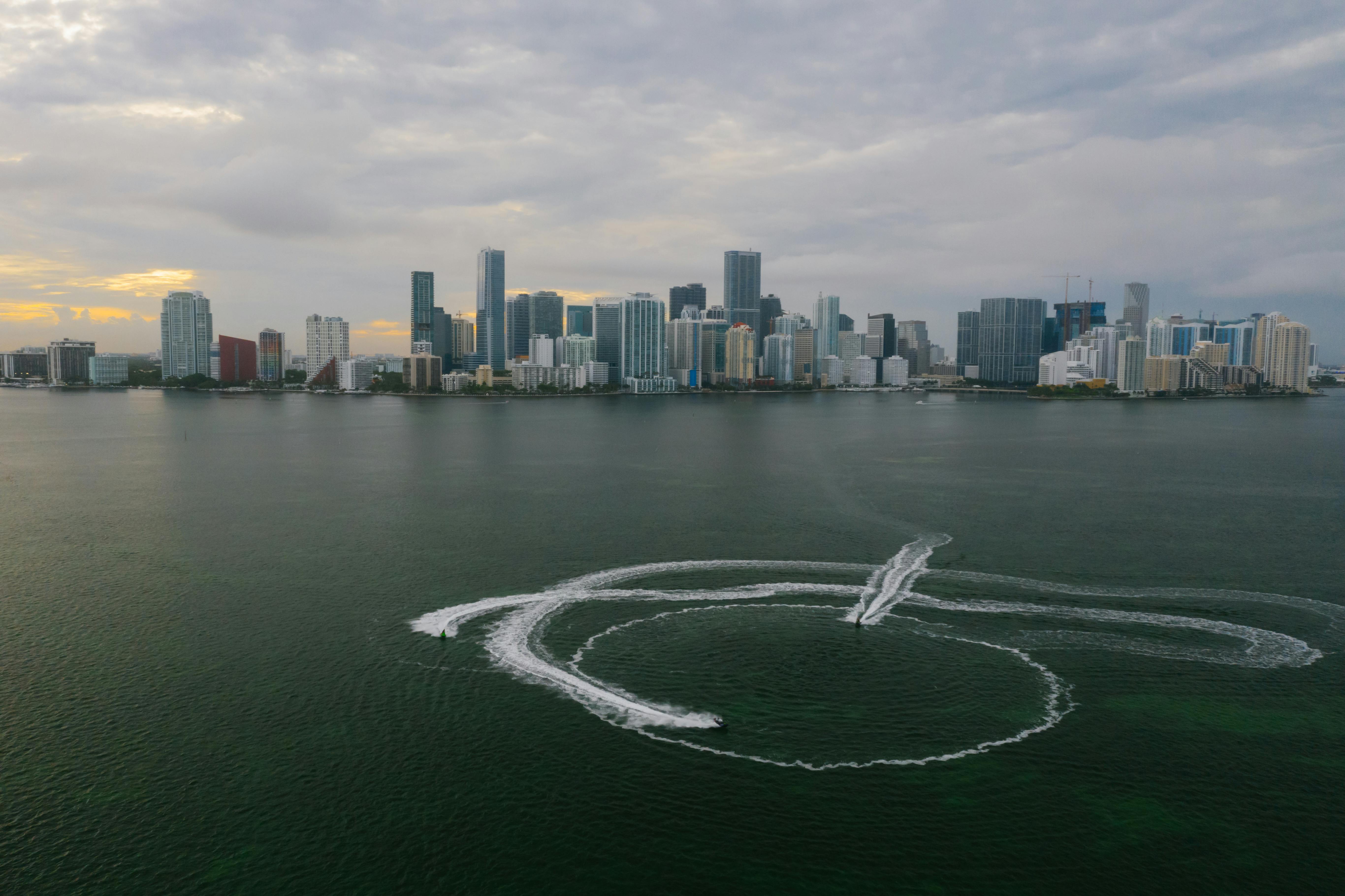 High Rise Buildings Near Body of Water · Free Stock Photo