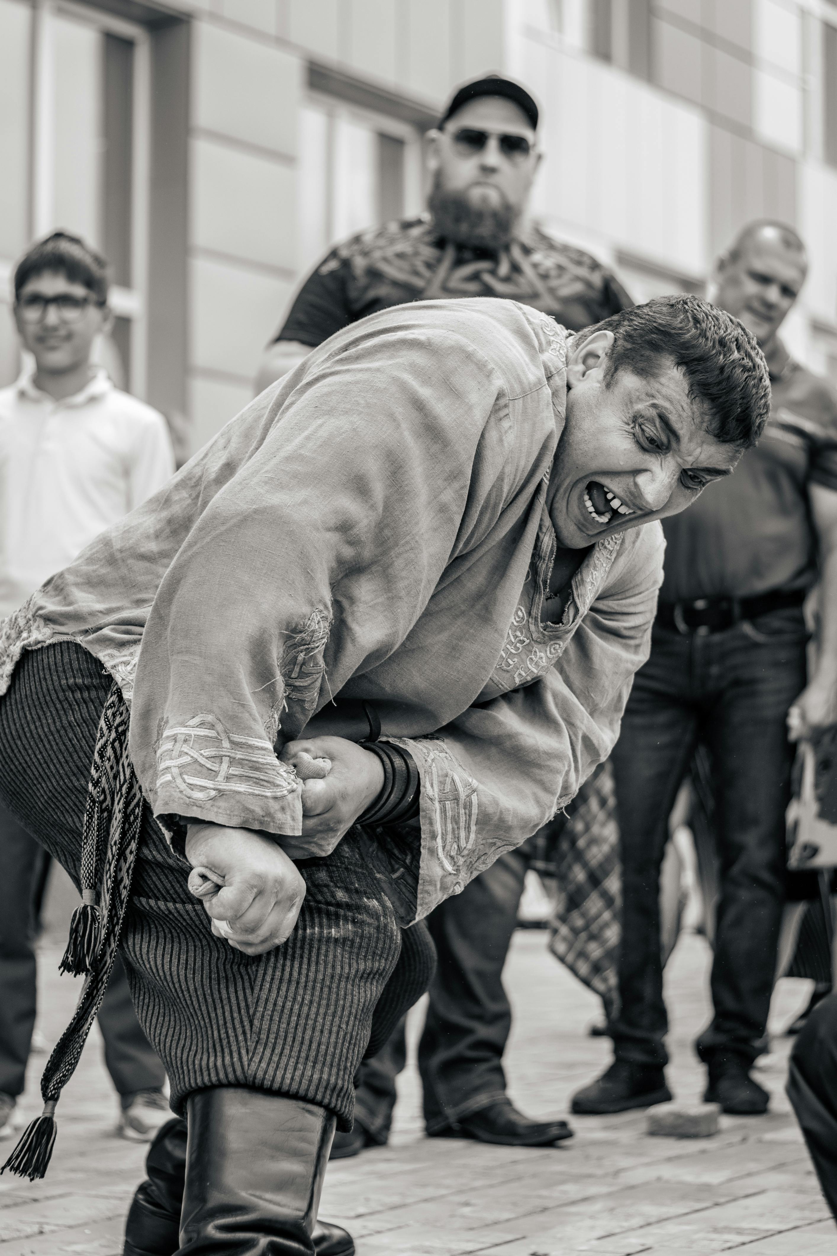 Brawny Man Pulling an Object · Free Stock Photo