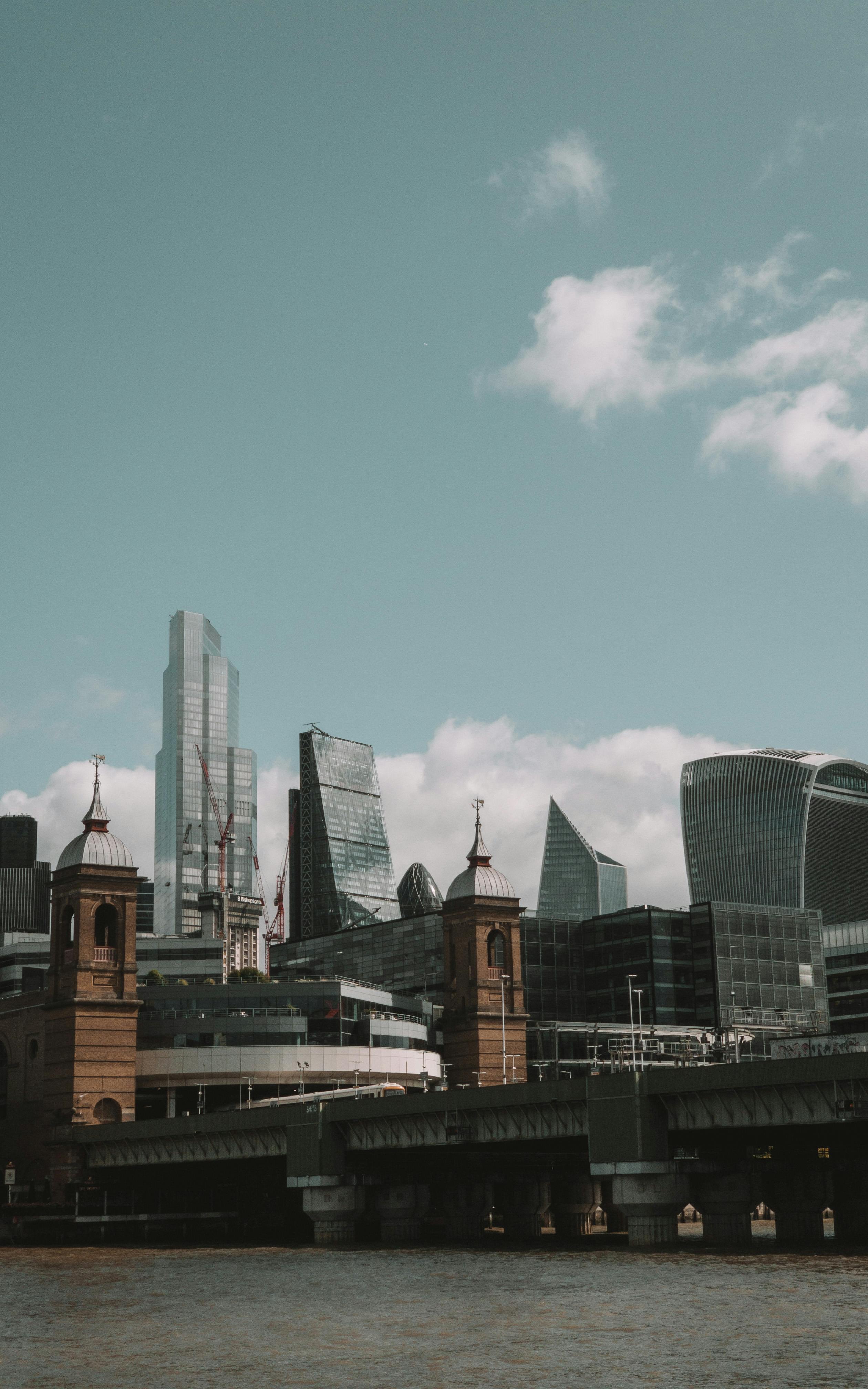 White Concrete Building Near Trees · Free Stock Photo