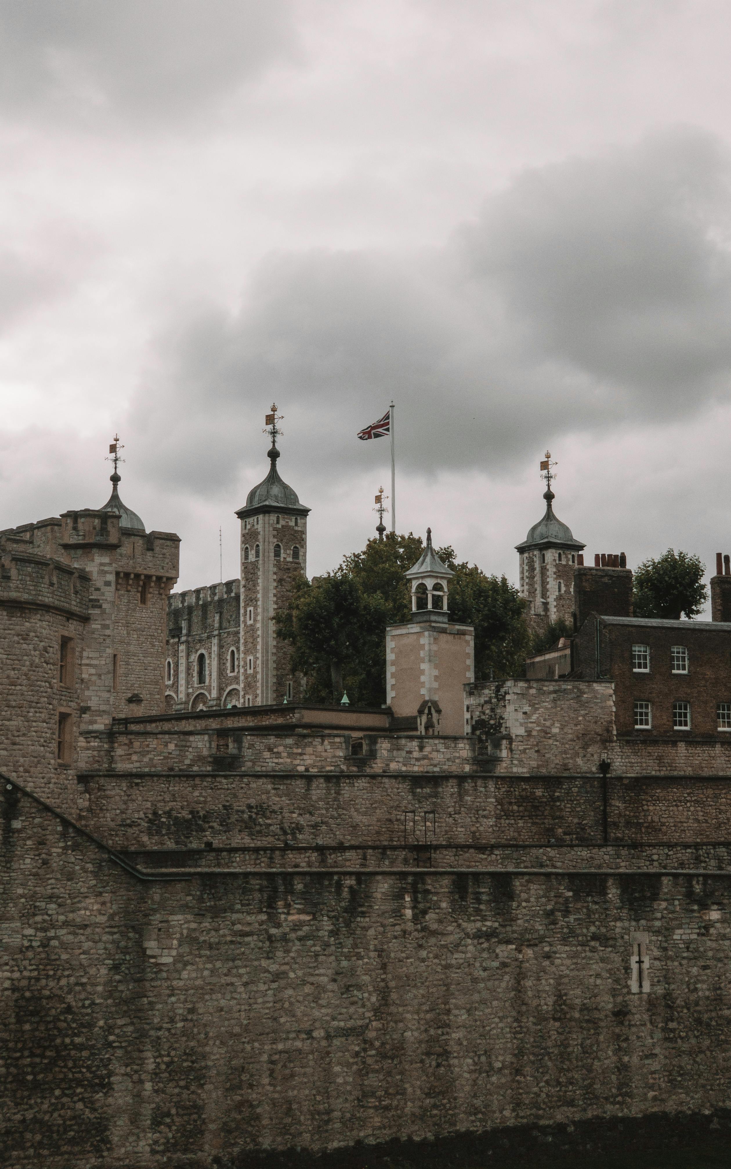 Castle with Flag Pole and Towers · Free Stock Photo