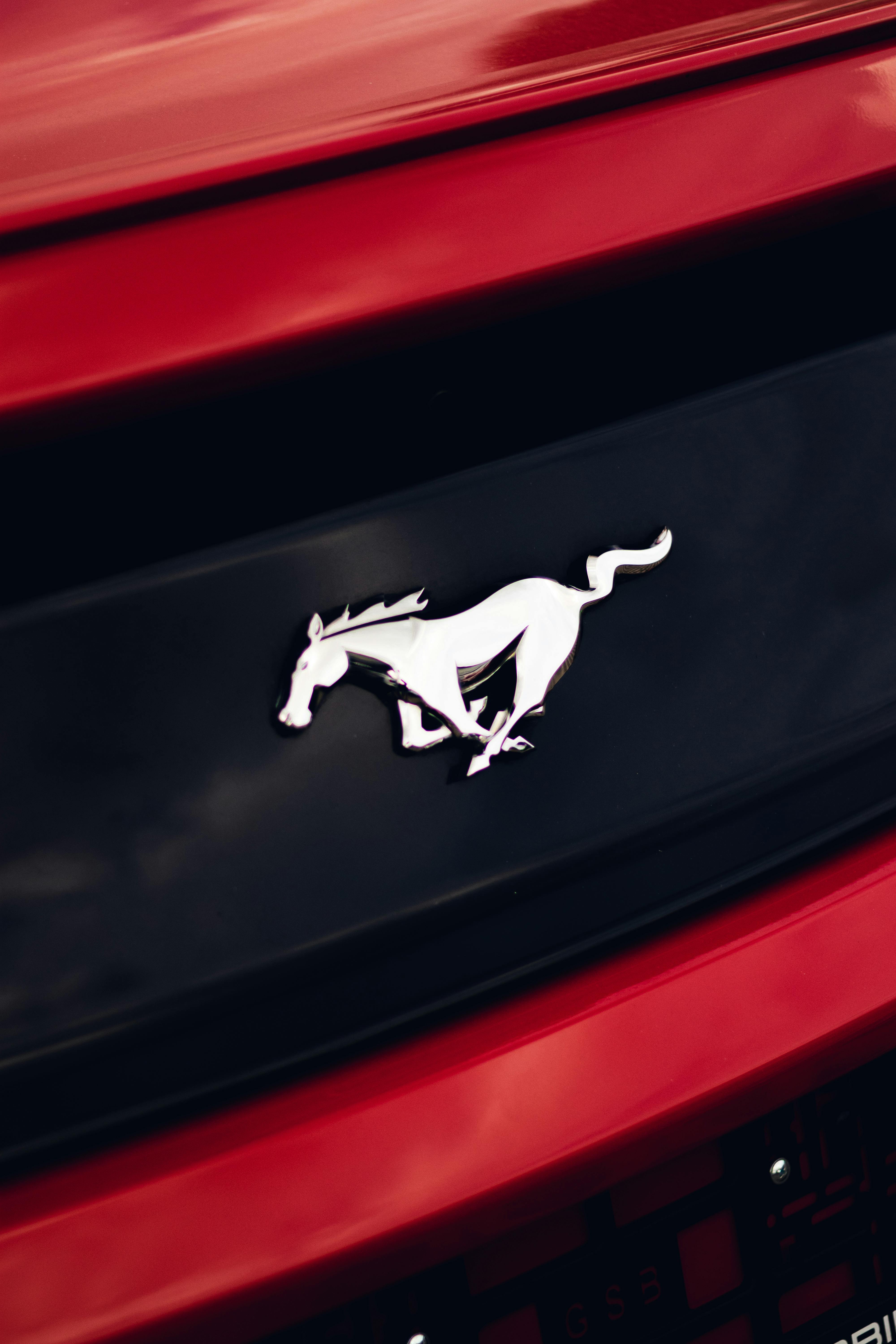 Emblem of a Ford Mustang · Free Stock Photo